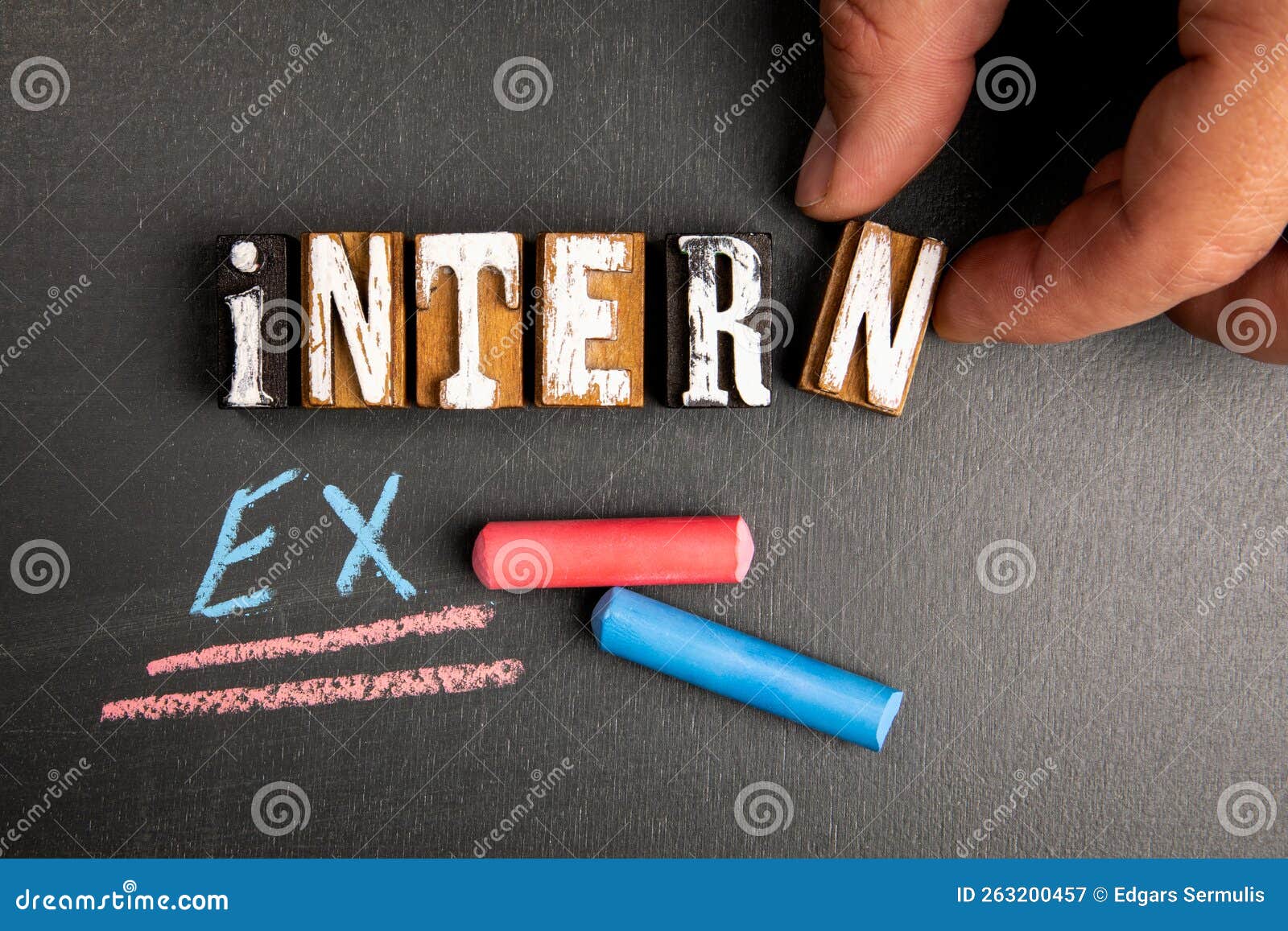 Intern and Extern Concept. Wooden Letter Blocks on Blackboard ...