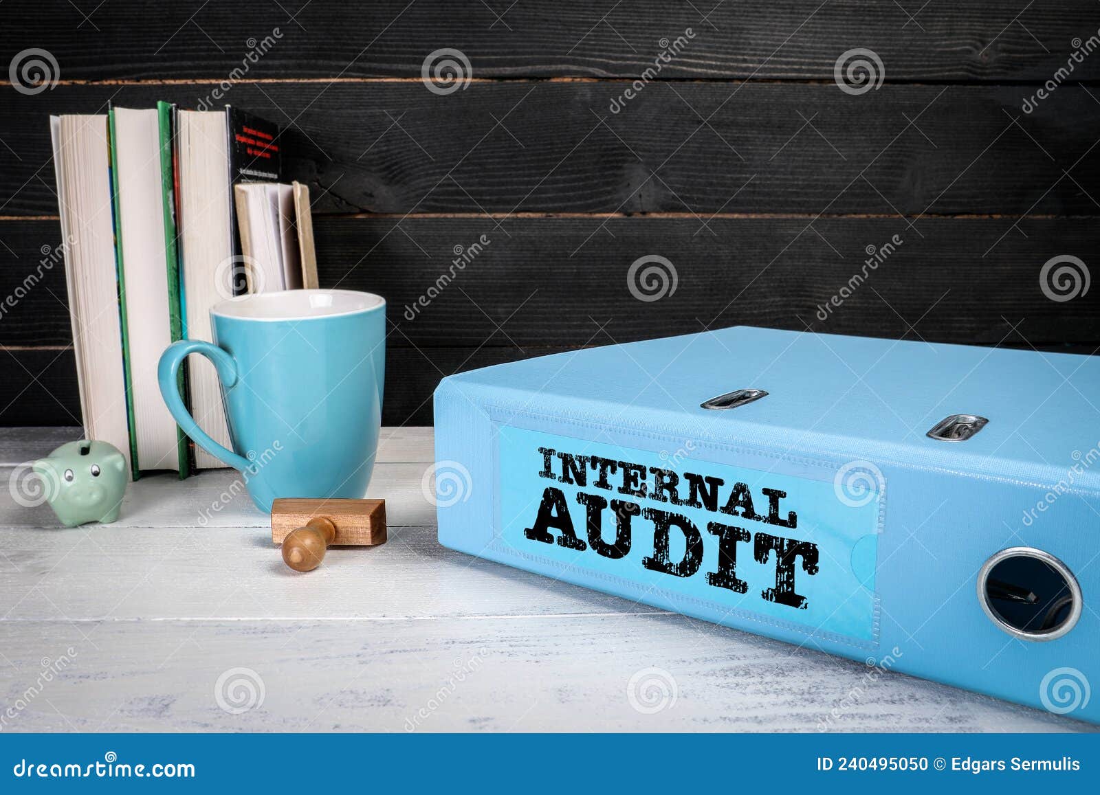 Internal Audit. Blue Office Document Binder on a Wooden Table Stock ...