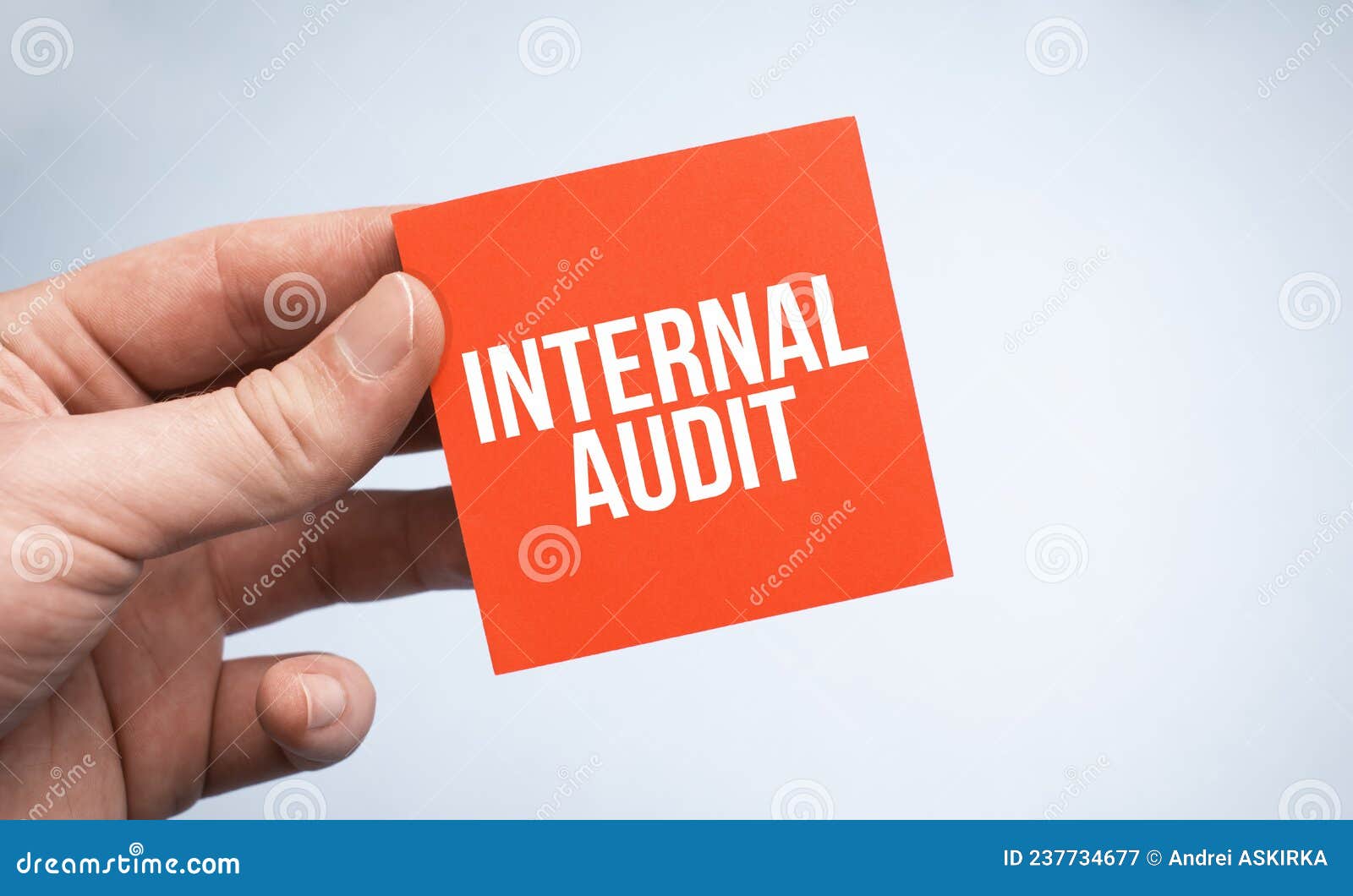 INTERNAL AUDIT Word on Paper in Businessman Hands Stock Image - Image ...