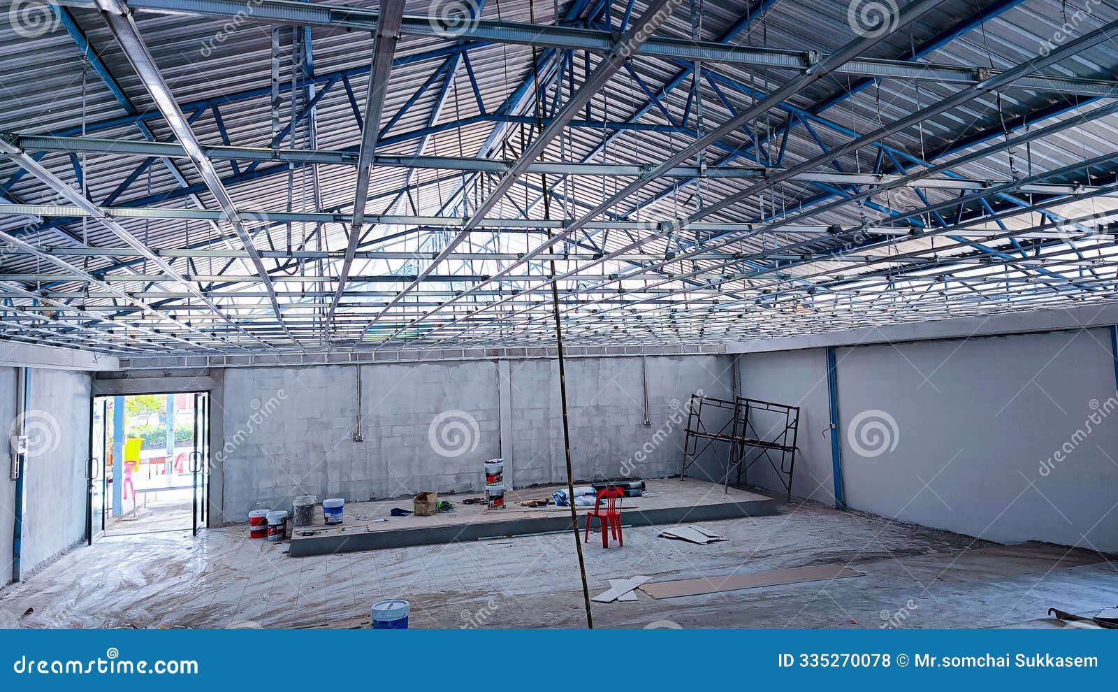 Ceiling Installation with Expert Technicians in the Room that is in the ...