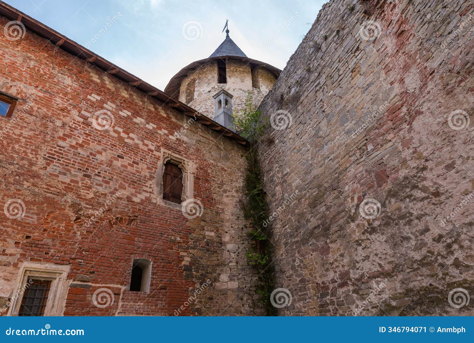 Internal Corner Facade Of An Ancient Villa With A Wrought-iron Balcony ...