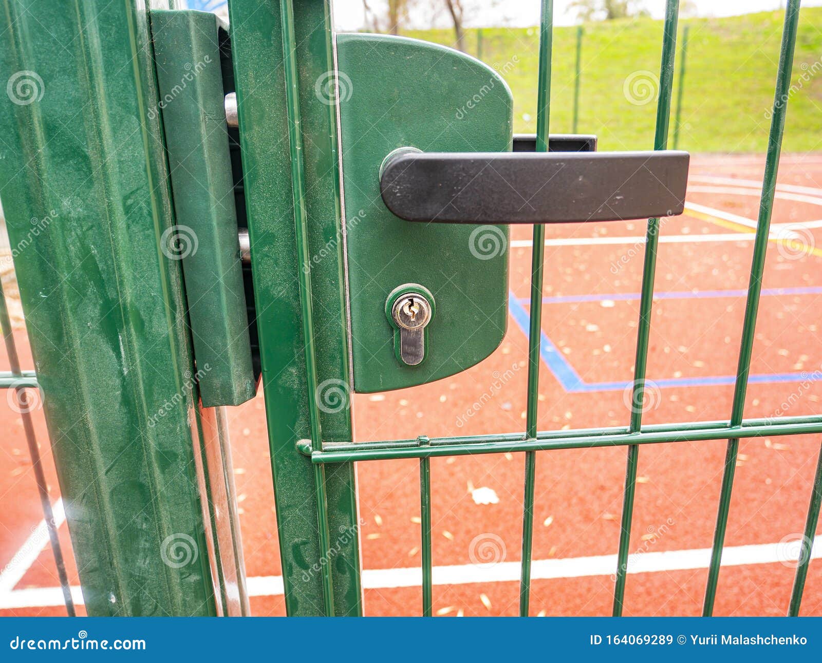 Internal Lock with a Handle on an Iron Street Gate Stock Image - Image ...