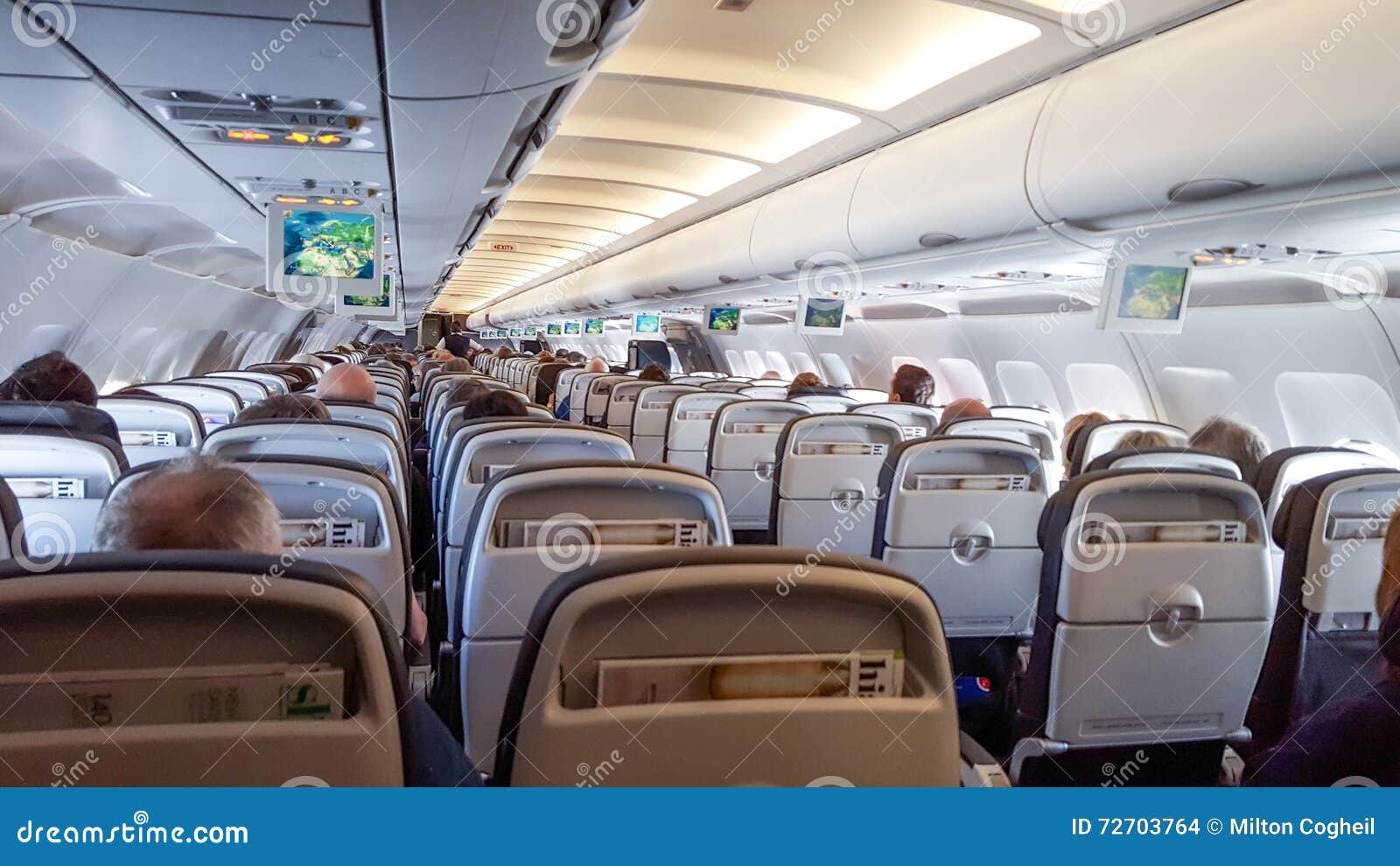 Internal View of an Airplane in Flight Stock Photo - Image of seats ...