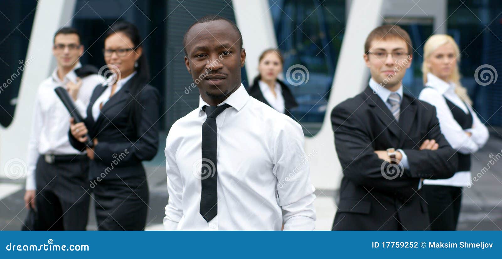 International Business Team with a Man in Front Stock Photo - Image of ...
