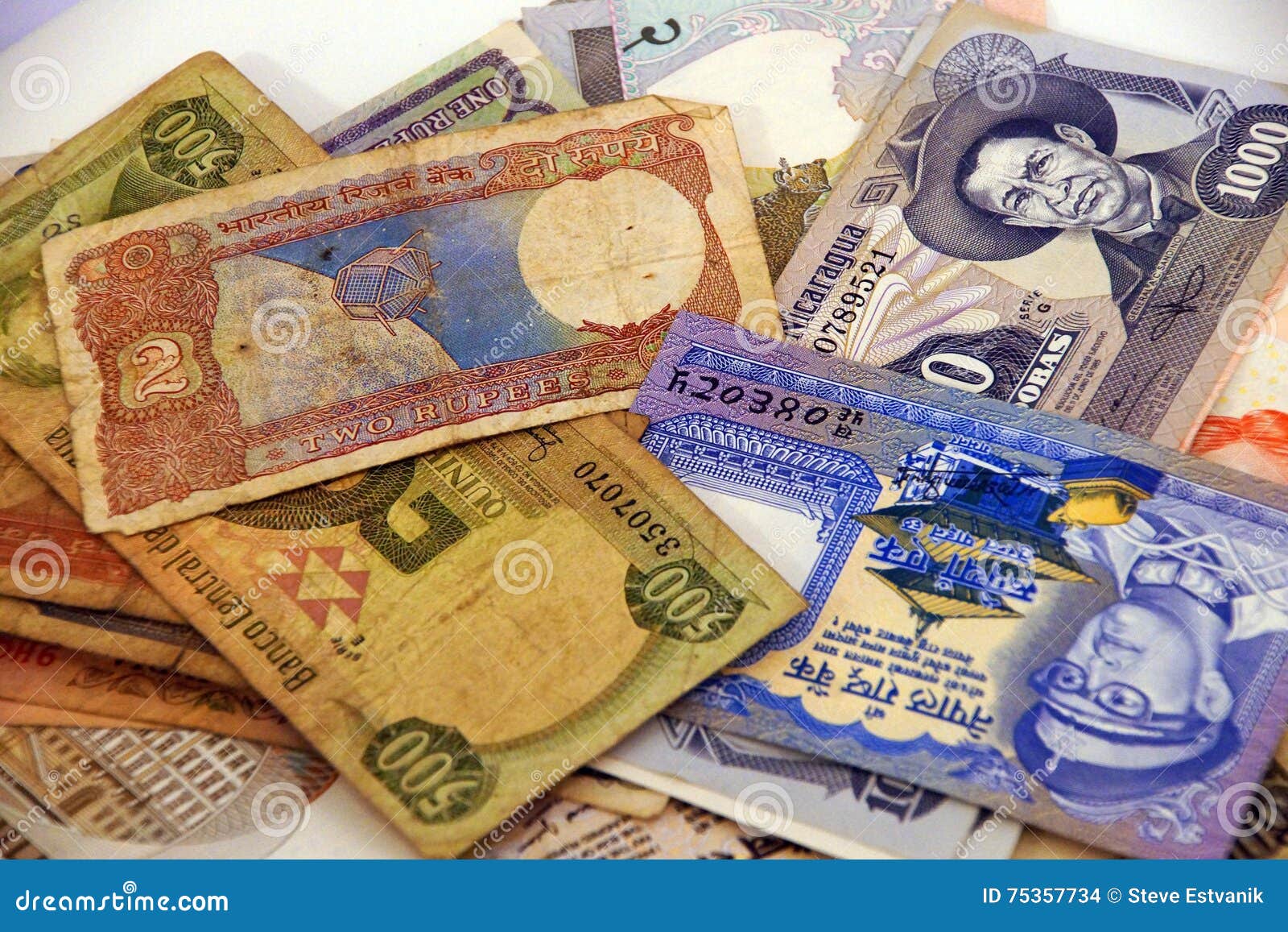 International Currency Notes Stock Photo - Image of finance, cash: 75357734