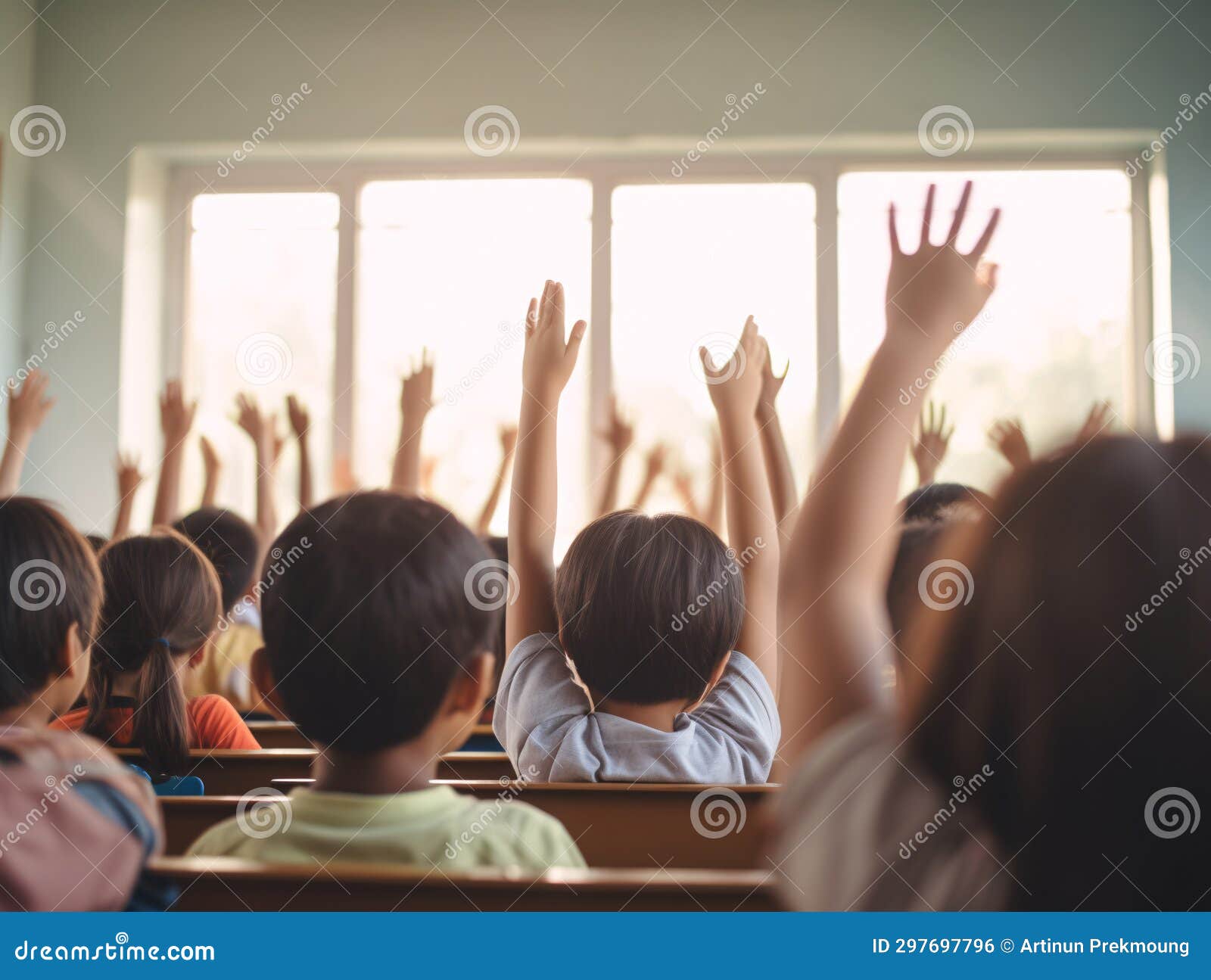 Students Raise Their Hands In A Classroom, Eager To Participate In A ... Students Raise Their Hands In A Classroom, Eager To Participate In A ...