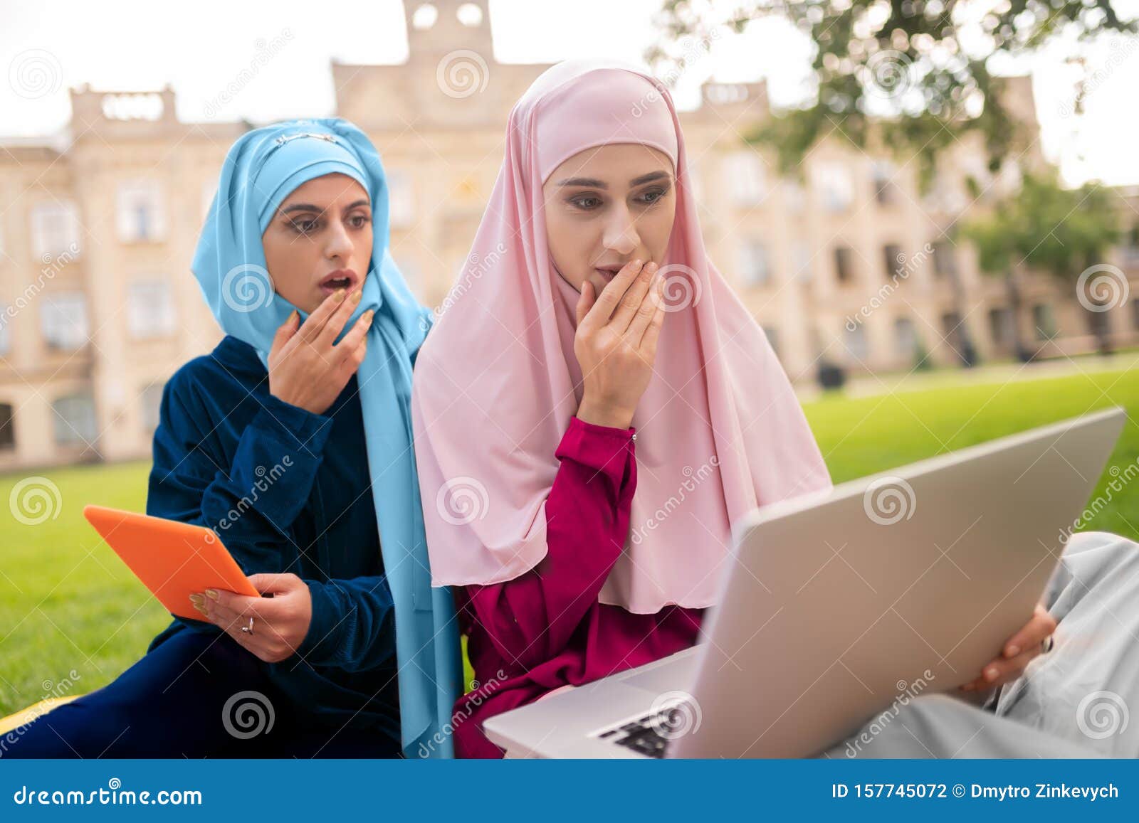 International Muslim Students Studying before Classes Together Stock ...