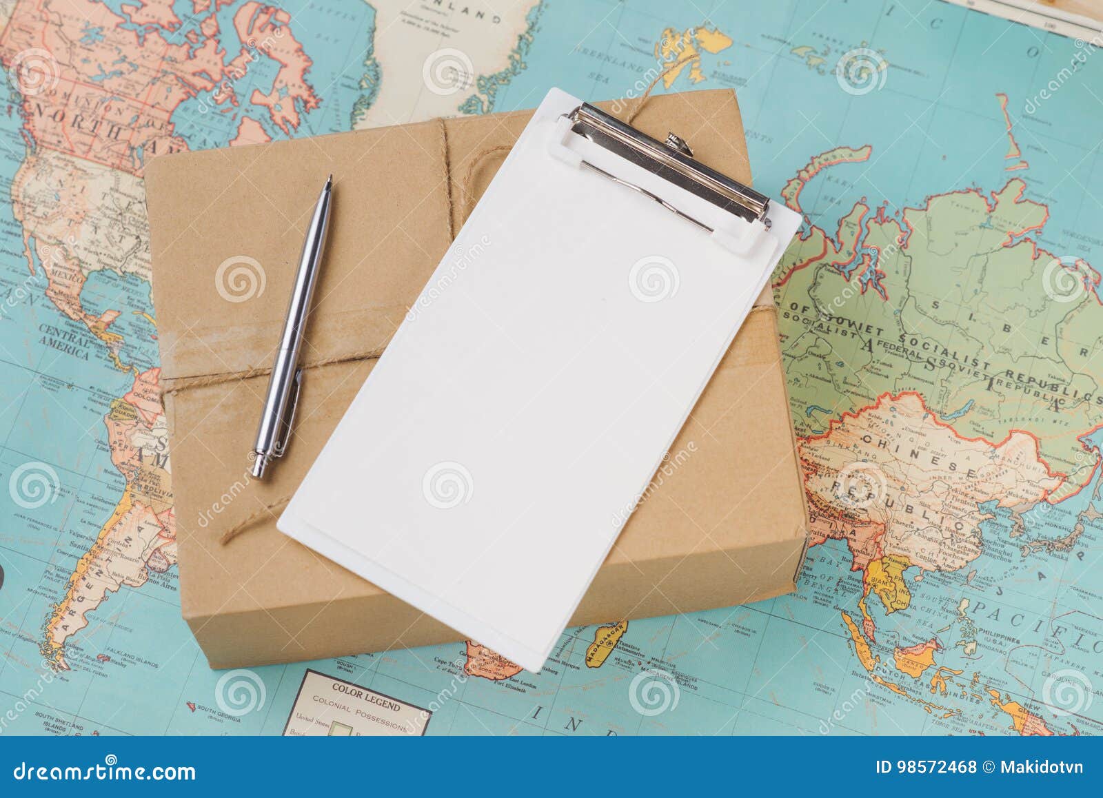 International Shipping. Cardboard Box on the Geographical Map Ba Stock ...