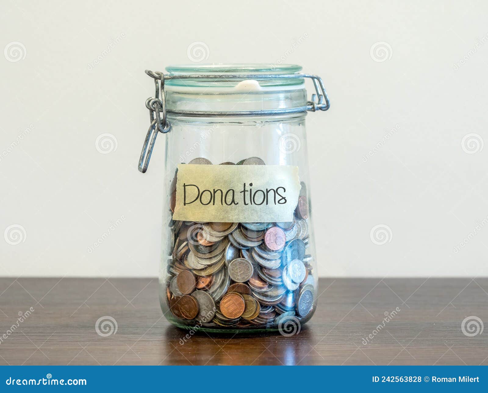 Small Change Donation in Glass Jar Stock Photo - Image of donate, goal ...