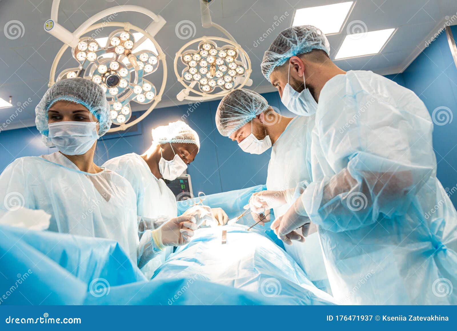An International Team of Doctors Performs a Complex Surgical Operation ...