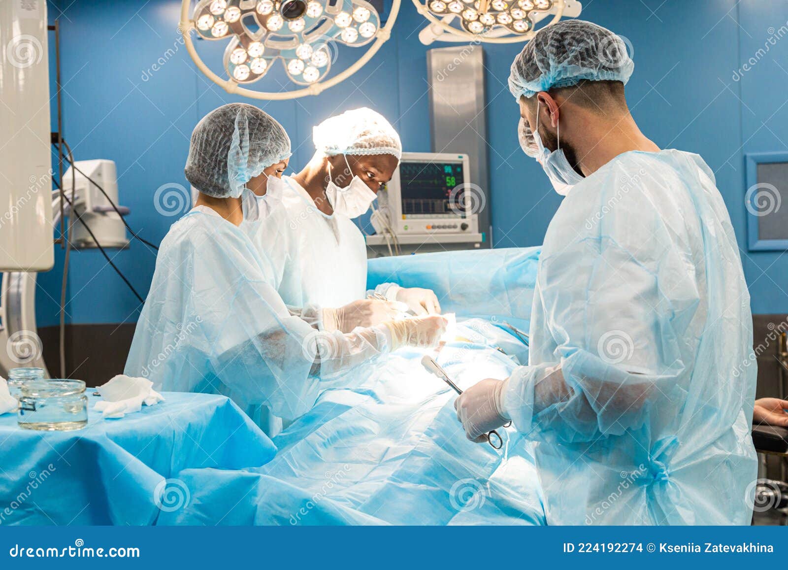 An International Team of Doctors Performs a Complex Surgical Operation ...