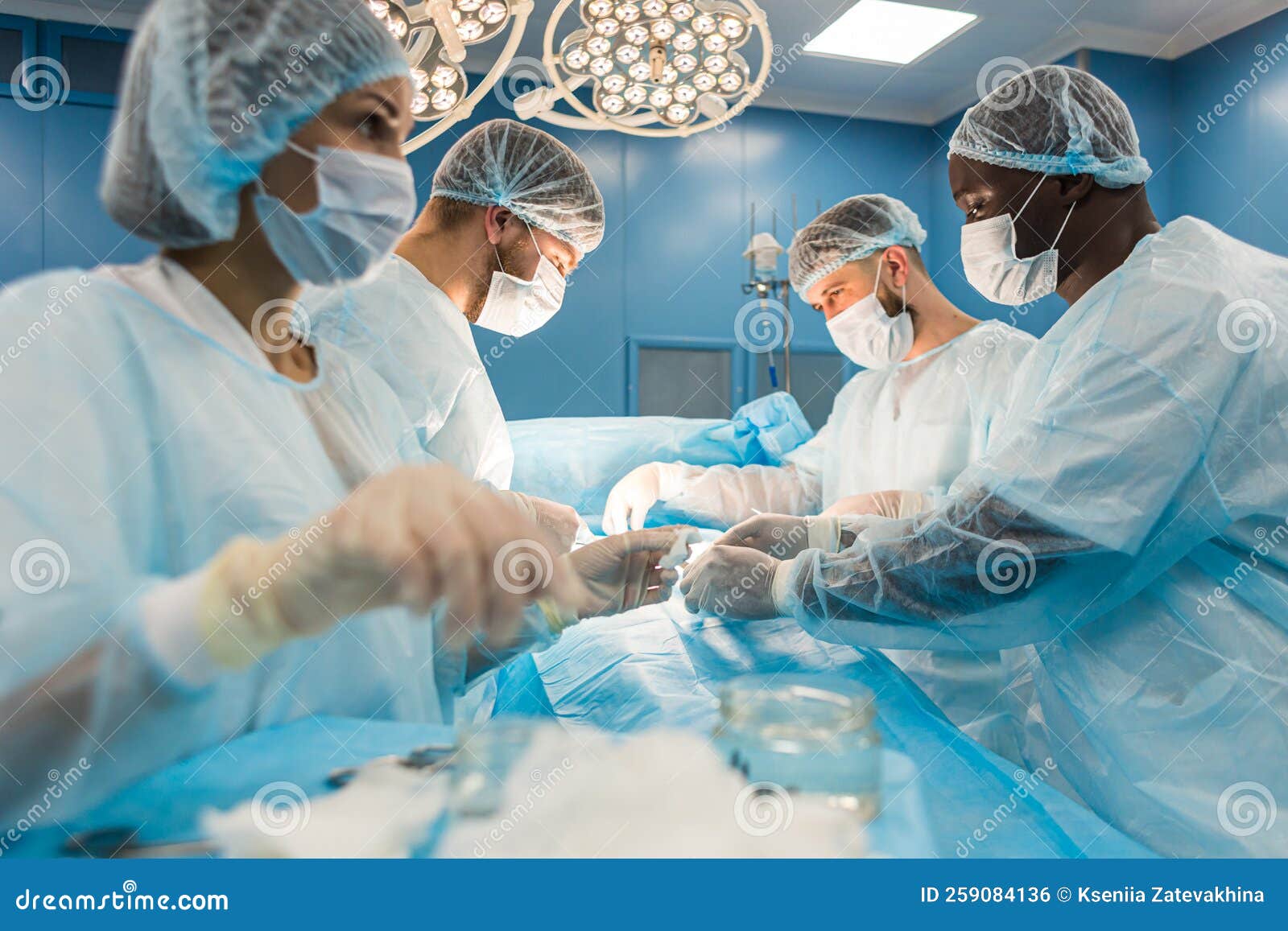 An International Team of Doctors Performs a Complex Surgical Operation ...