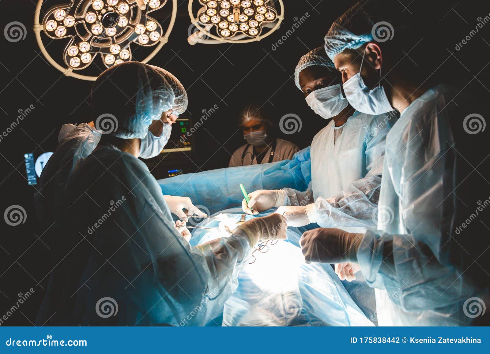An International Team of Doctors Performs a Complex Surgical Operation ...
