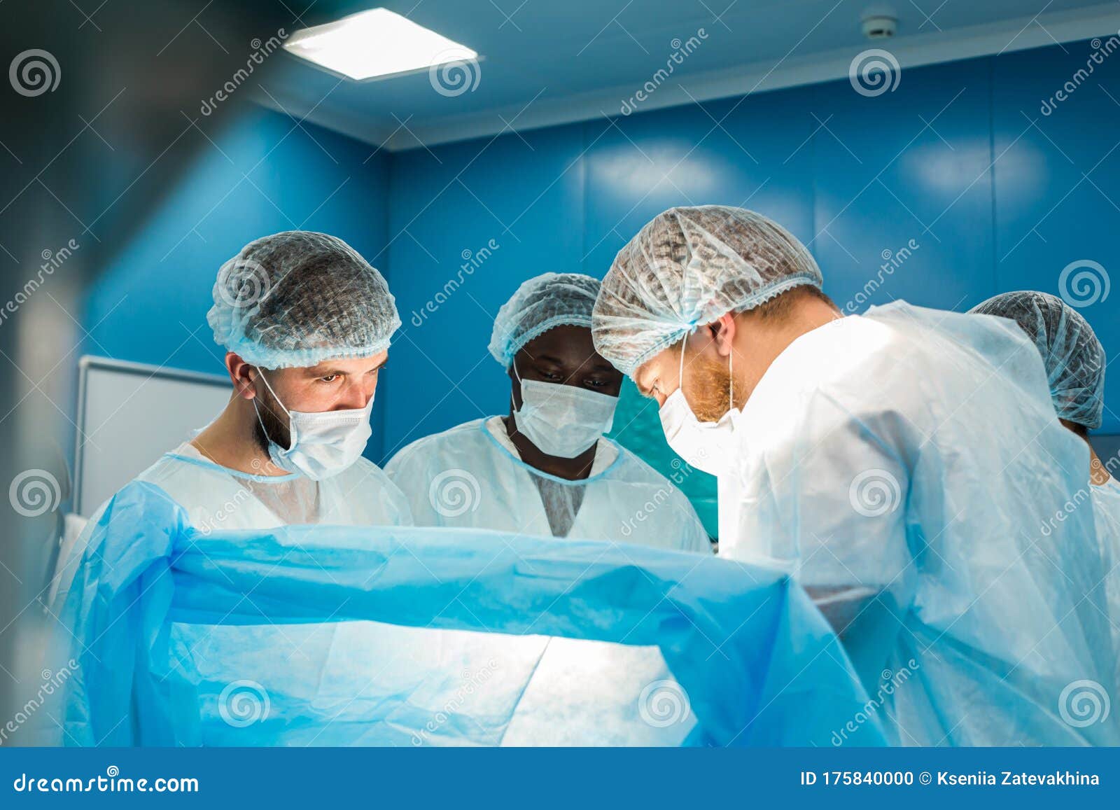 An International Team of Doctors Performs a Complex Surgical Operation ...
