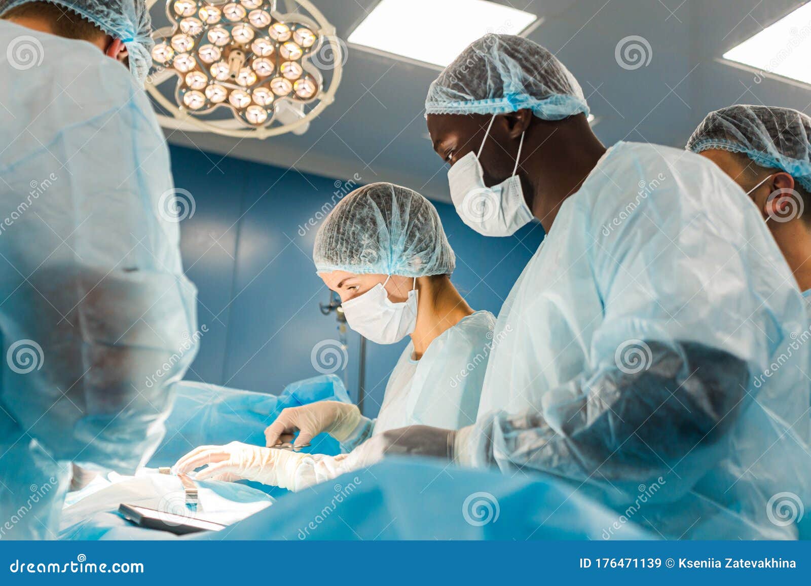 An International Team of Doctors Performs a Complex Surgical Operation ...