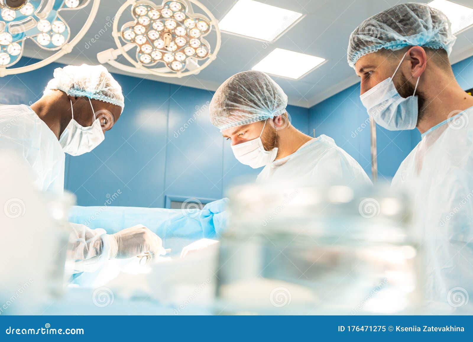 An International Team of Doctors Performs a Complex Surgical Operation ...