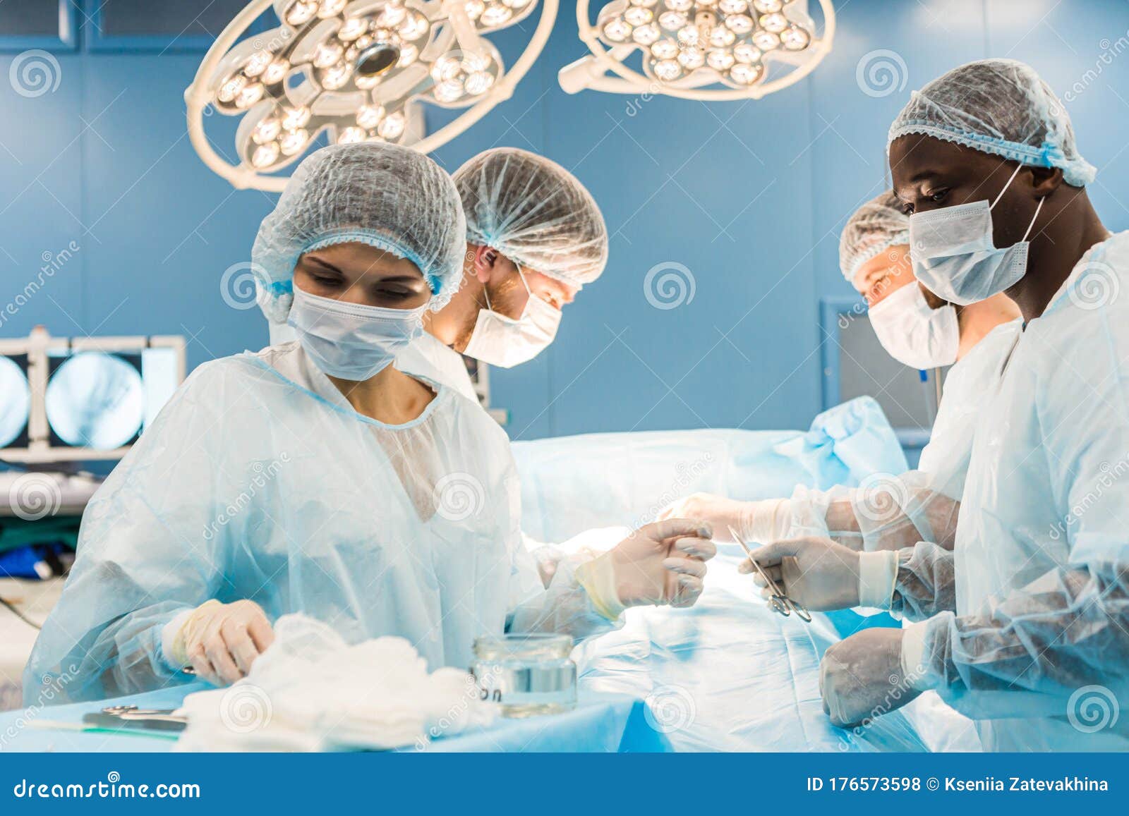 An International Team of Doctors Performs a Complex Surgical Operation ...