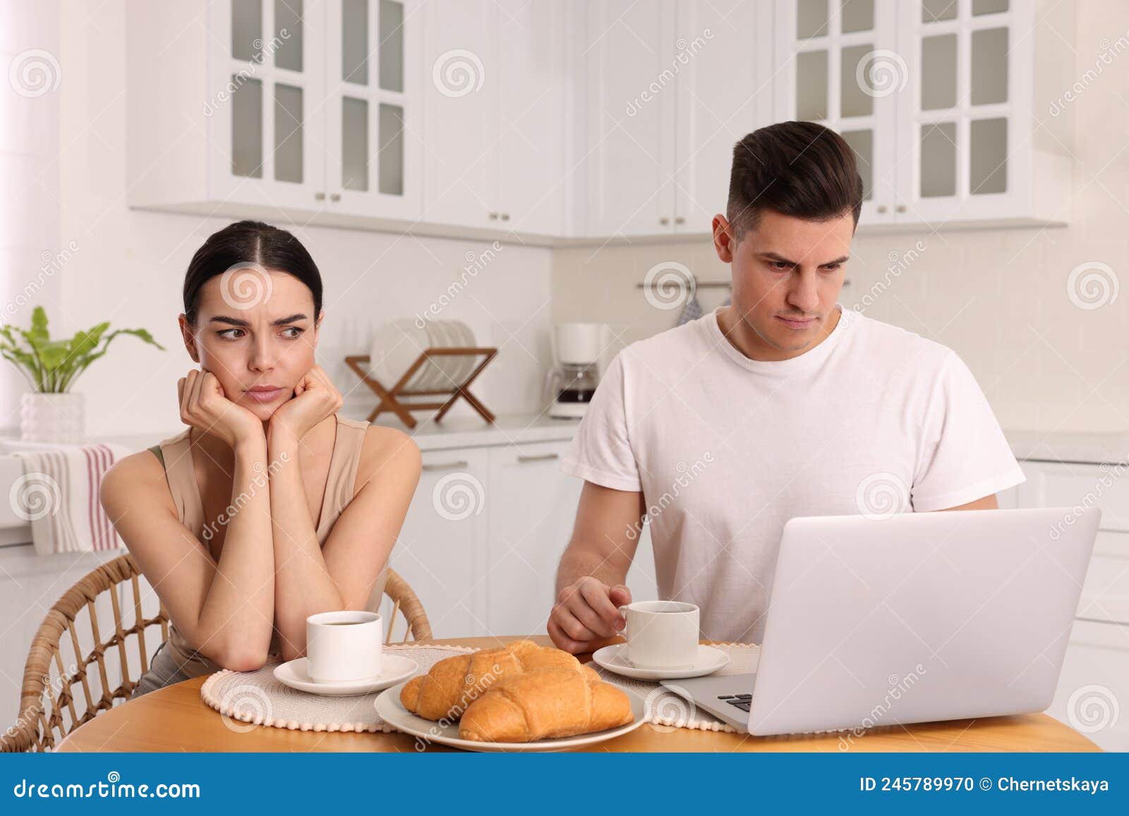Internet Addiction. Man with Laptop Ignoring His Girlfriend in Kitchen ...