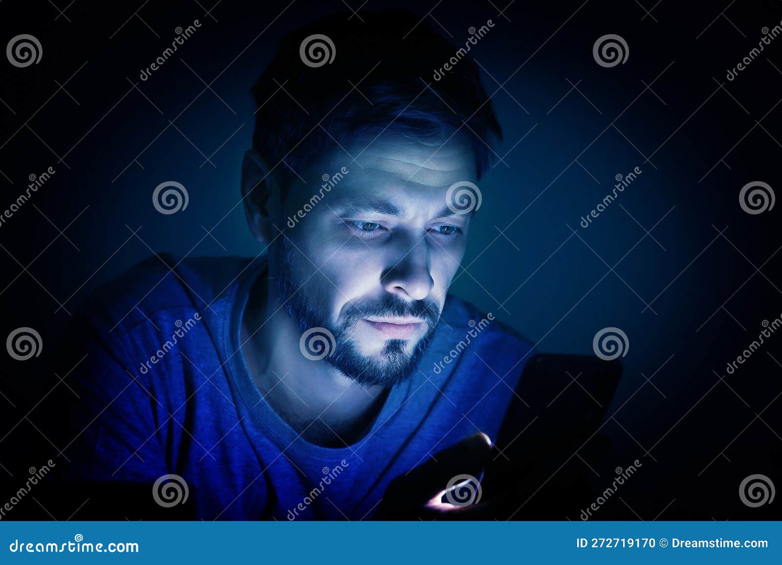 Internet Addiction. Man Using Smartphone at Night. Toned in Blue Stock ...