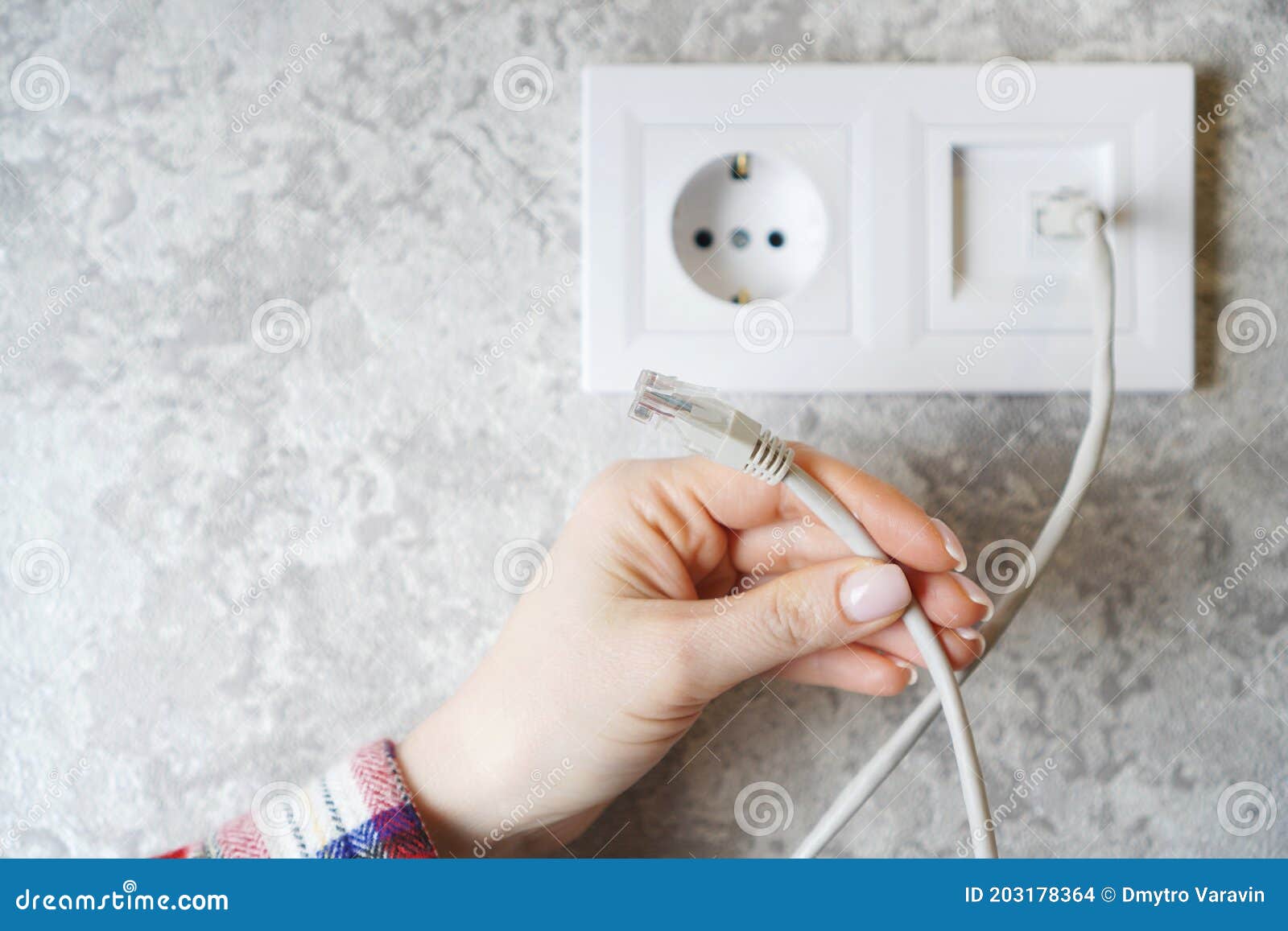 Internet Cable in Female Hands. Network Socket on the Backdrop Stock ...