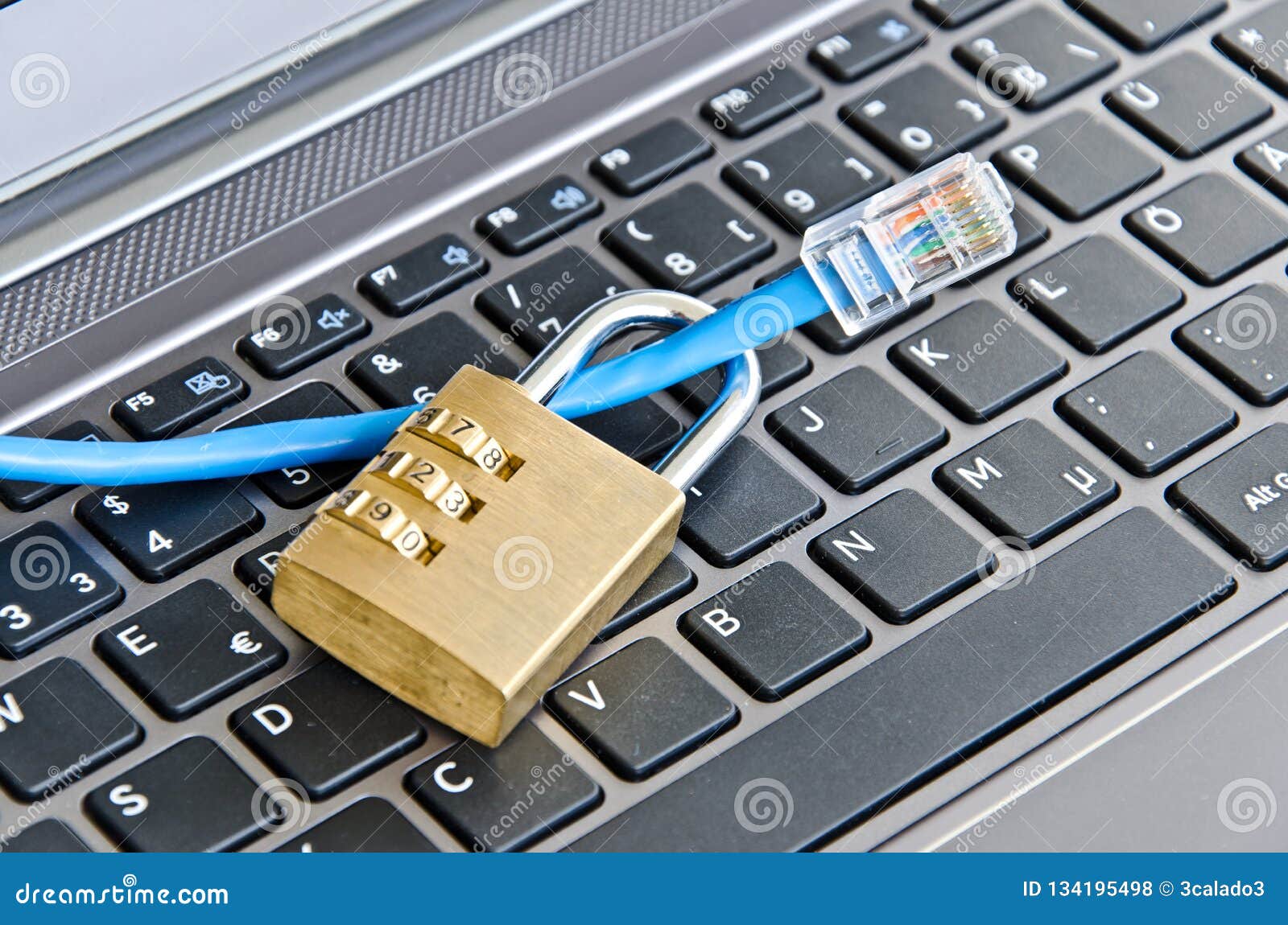 Internet Cable Sticking through Padlock on Computer Keyboard ...