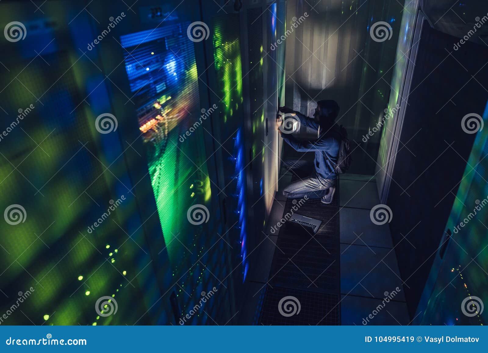Hacker in data centre stock image. Image of datacenter - 104995419