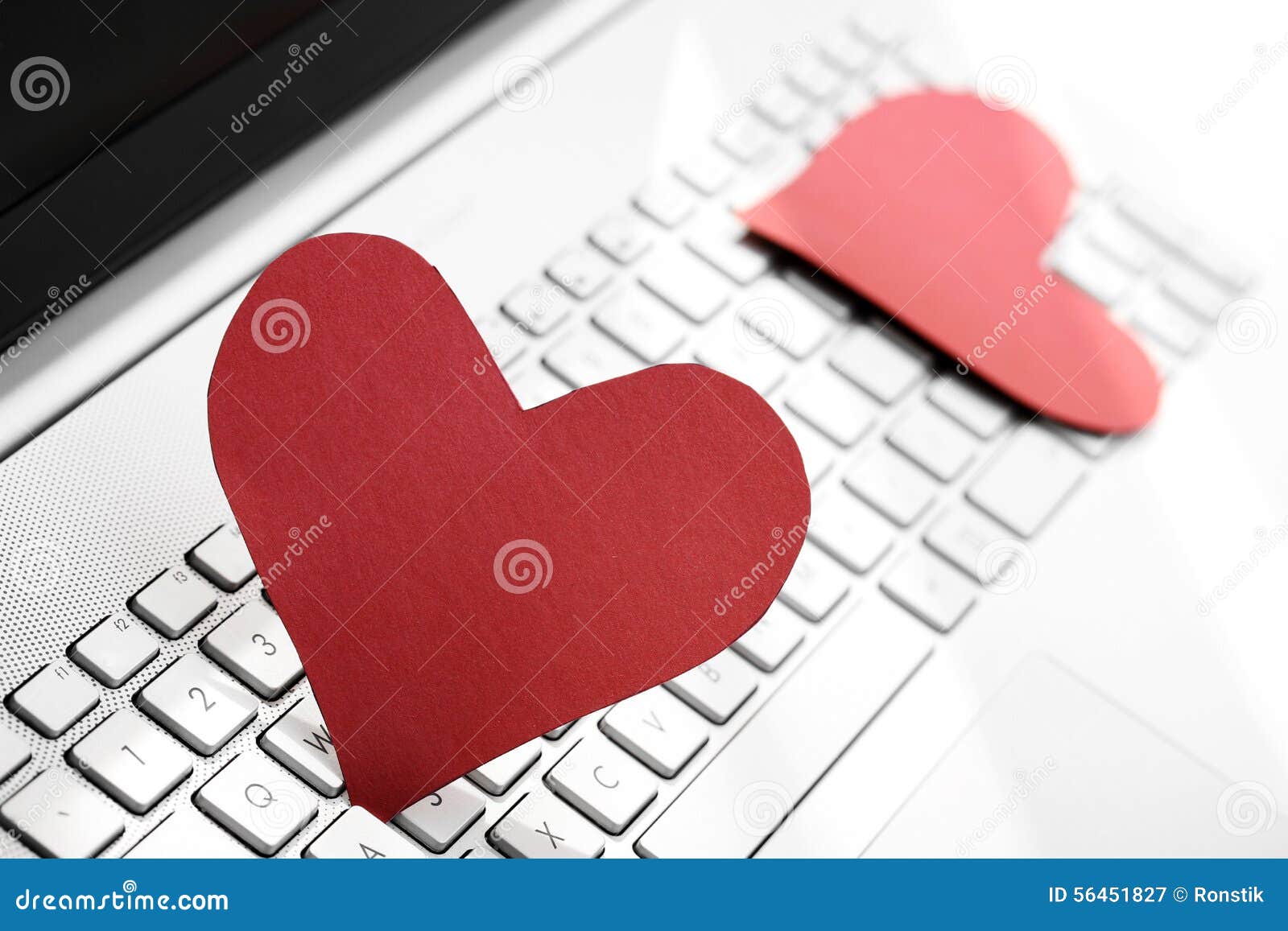 Internet Dating Concept - Two Paper Hearts on Computer Keyboard Stock ...