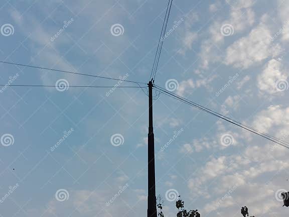 An Internet Pole with Several Cables Stretched Out Stock Image - Image ...