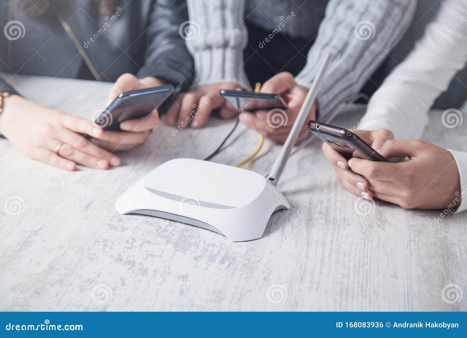 Internet Router in the Desk. People Using Smartphones Stock Photo ...