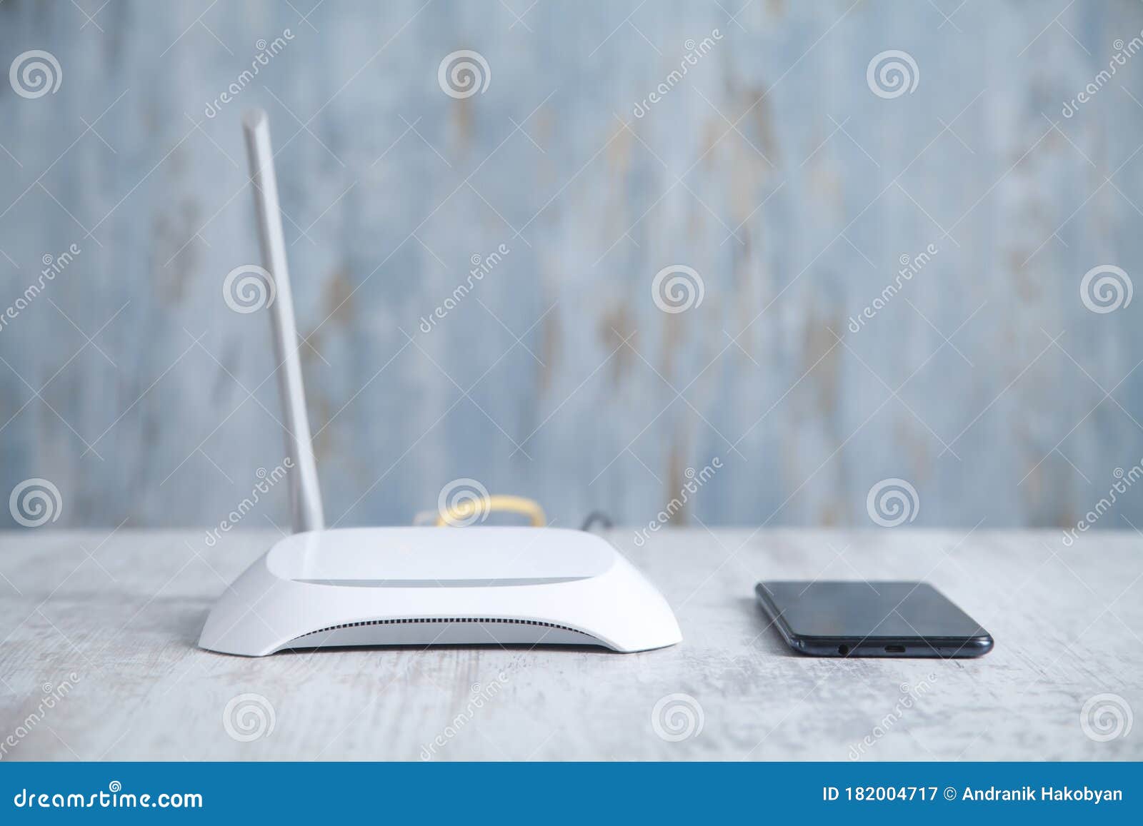 Internet Router with Smartphone on the Desk. Network, Technology Stock ...
