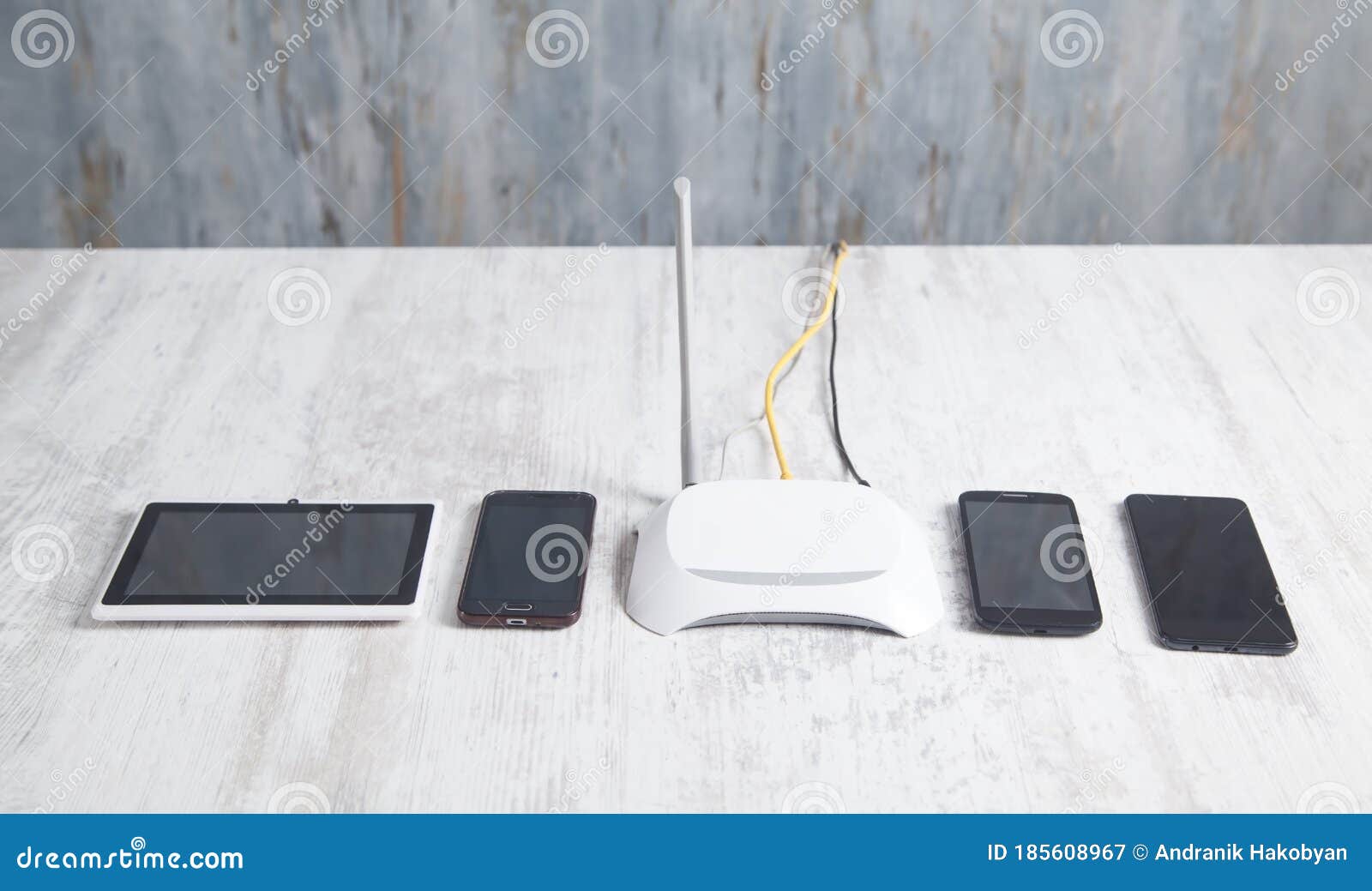 Internet Router with a Smartphones and Tablet on the Desk. Network ...