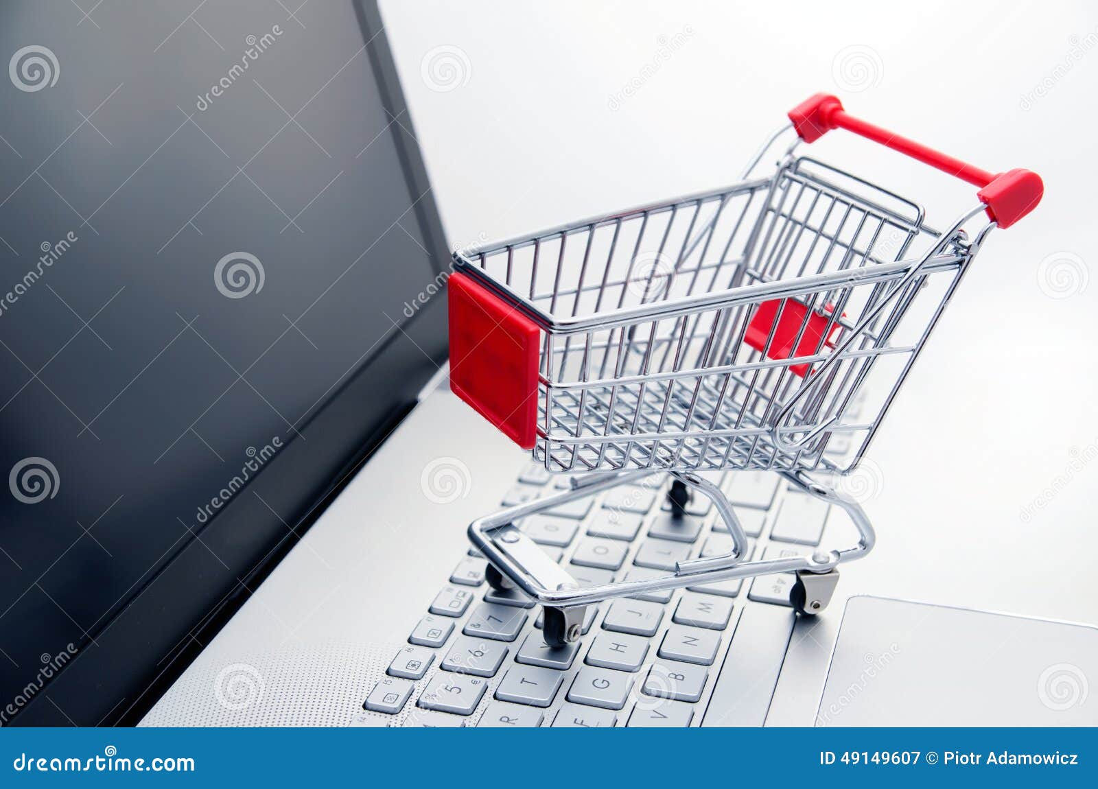 Internet Shopping Concept. Basket on Laptop Keyboard Stock Image ...