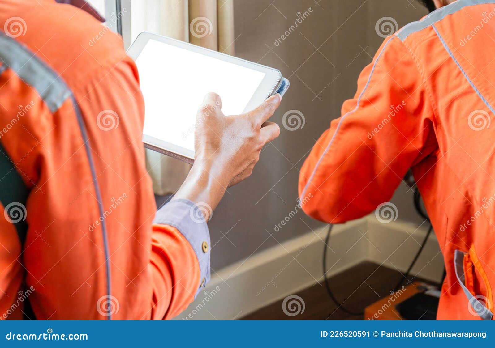 An Internet Technician Is Repairing Or Maintaining A Fiber Optic ...