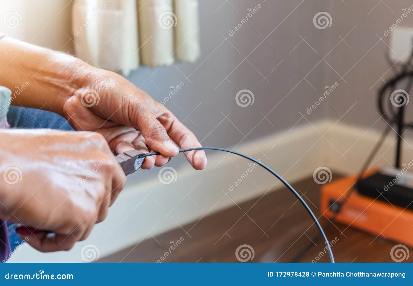 Internet Technician Man are Cutting and Installation Fiber Optic Cables ...
