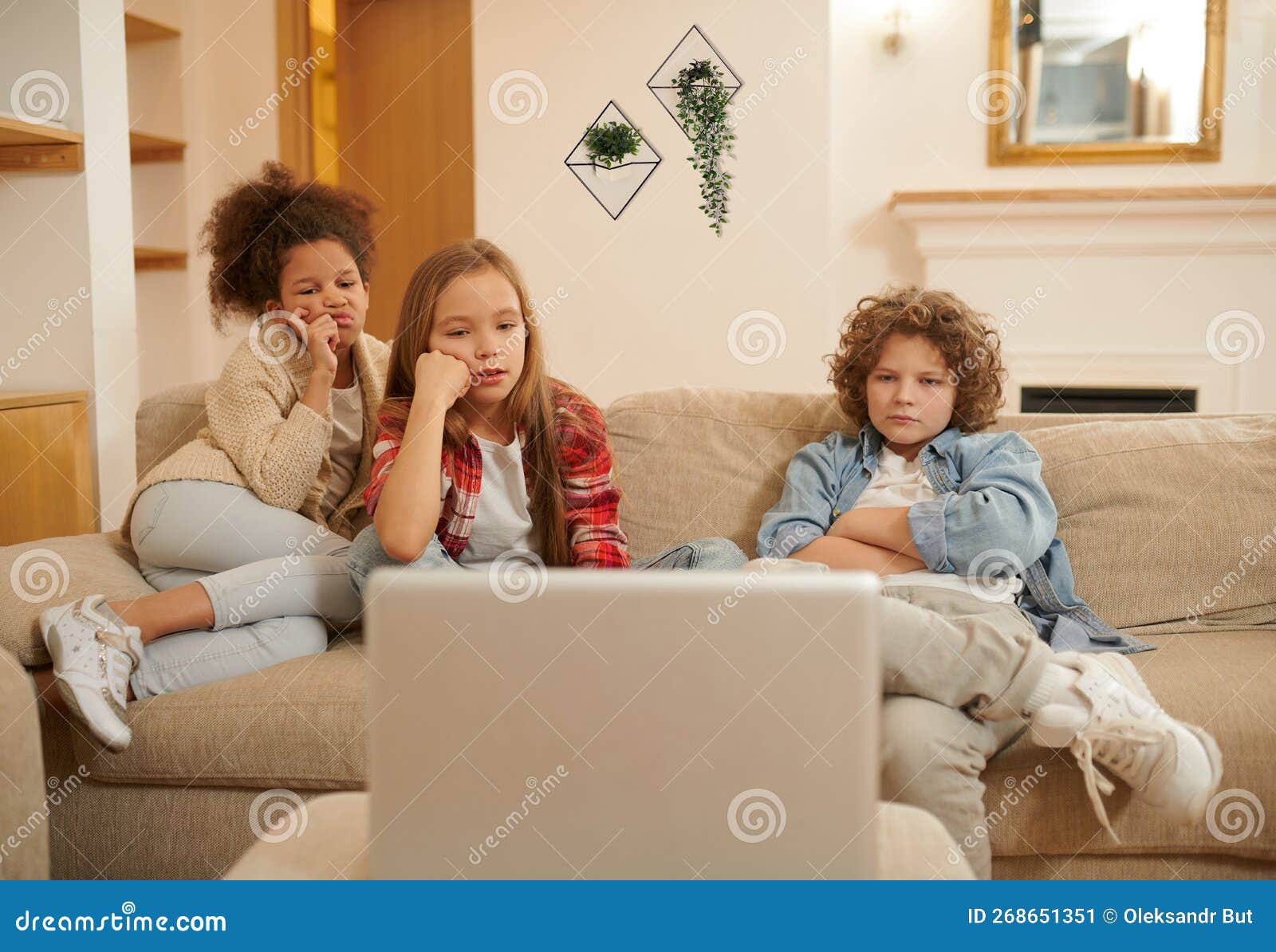 Three Kids Watching Something on a Laptop Stock Image - Image of ...