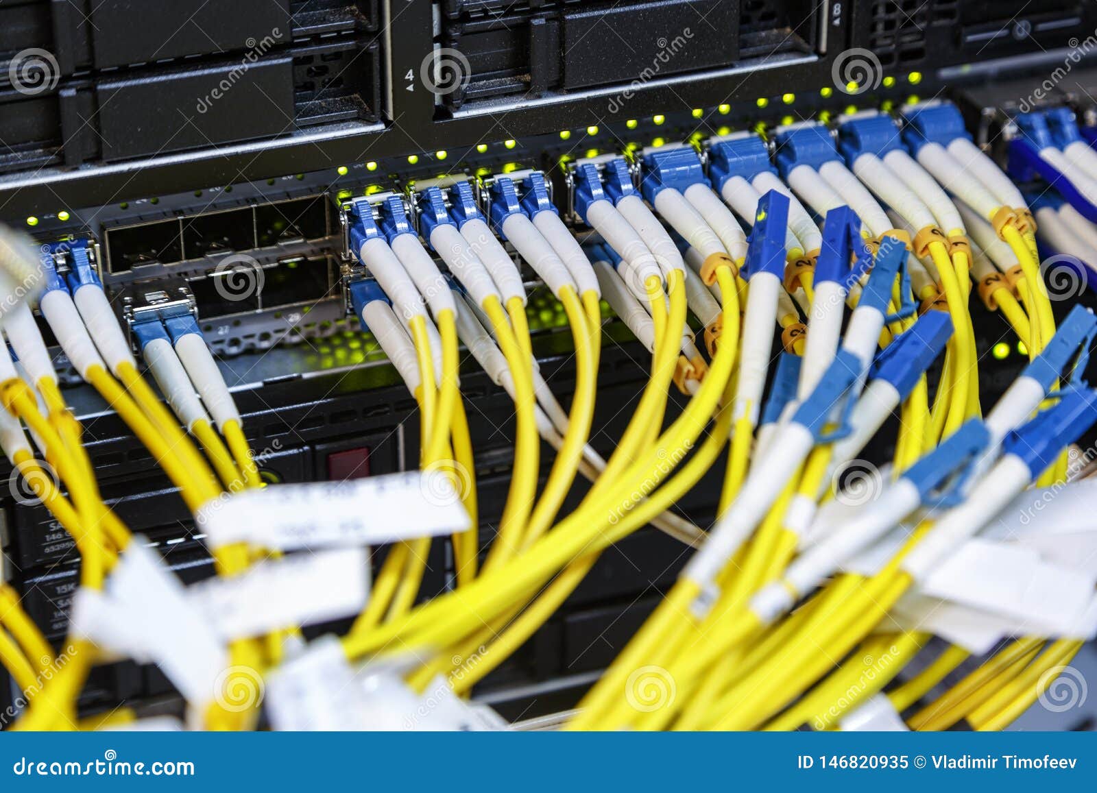 Internet Wires Fiber Optic Connecting on Core Network Swtich in Server ... Internet Wires Fiber Optic Connecting on Core Network Swtich in Server ...