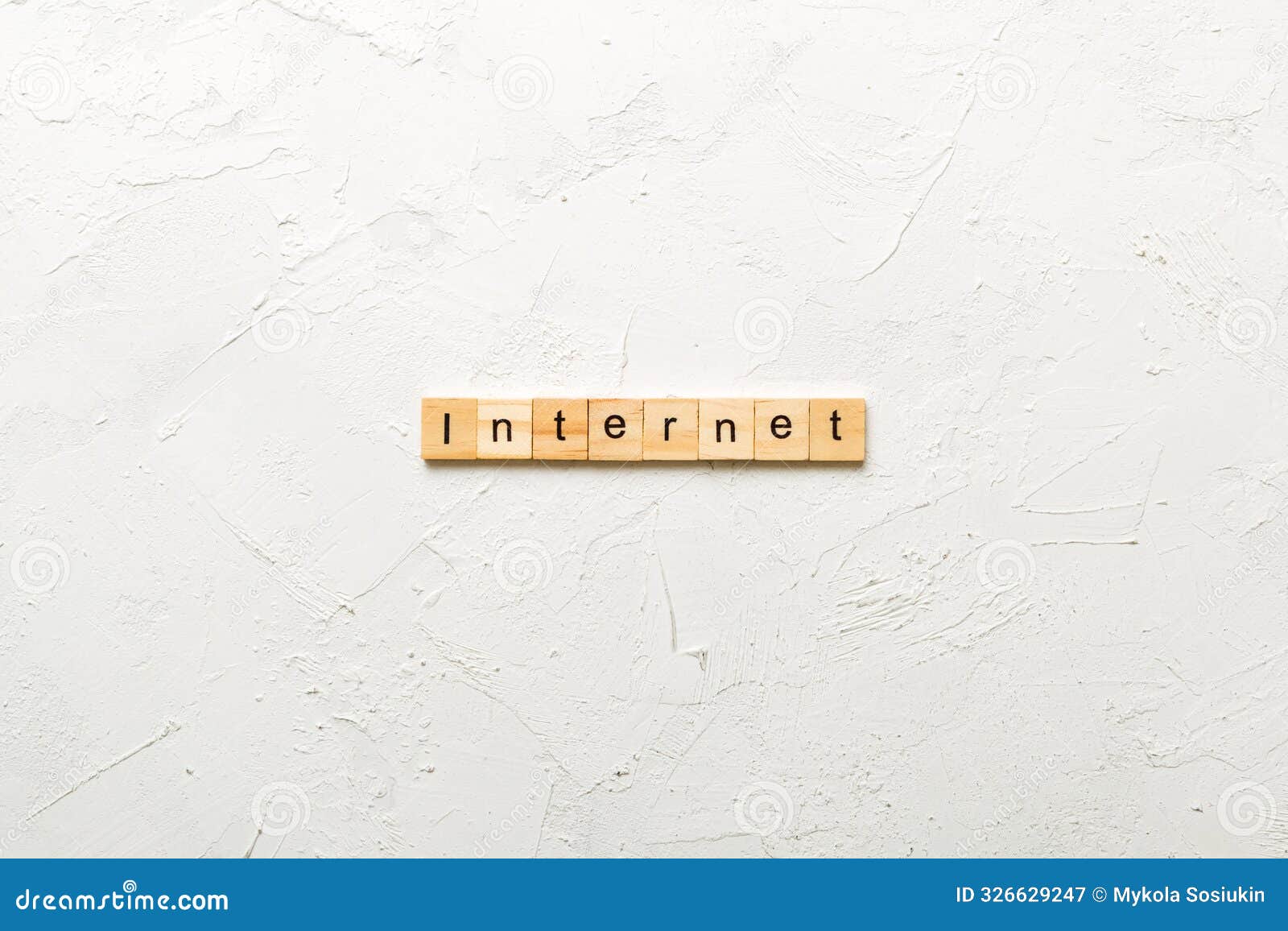INTERNET Word Written on Wood Block. INTERNET Text on Cement Table for ...
