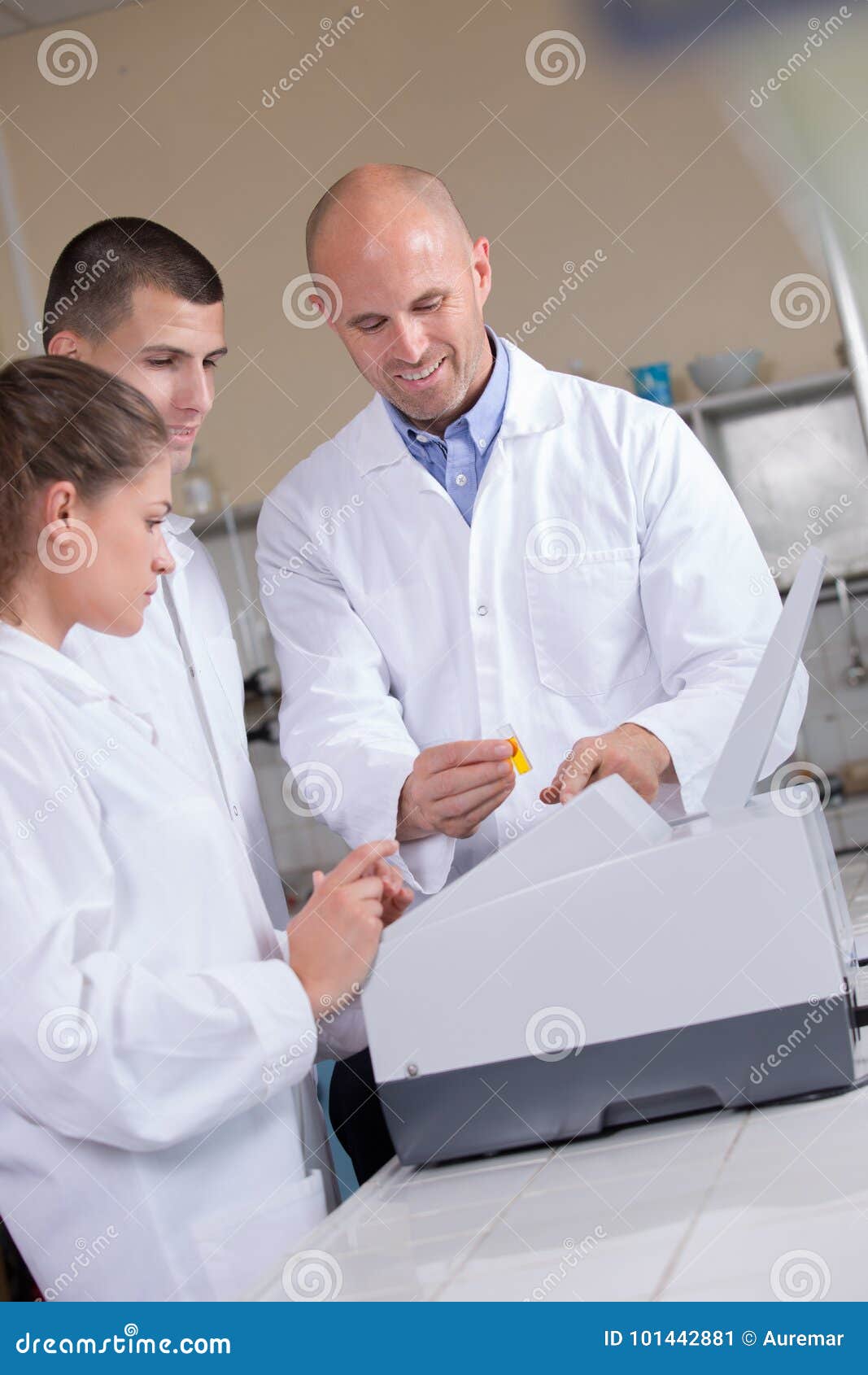 Interns in Laboratory with Professor Stock Image - Image of experiment ...