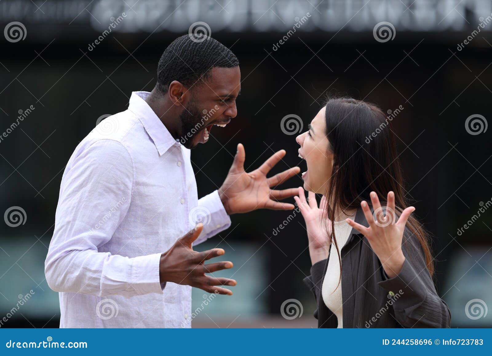 Interracial Couple Arguing in the Street Stock Photo - Image of ...