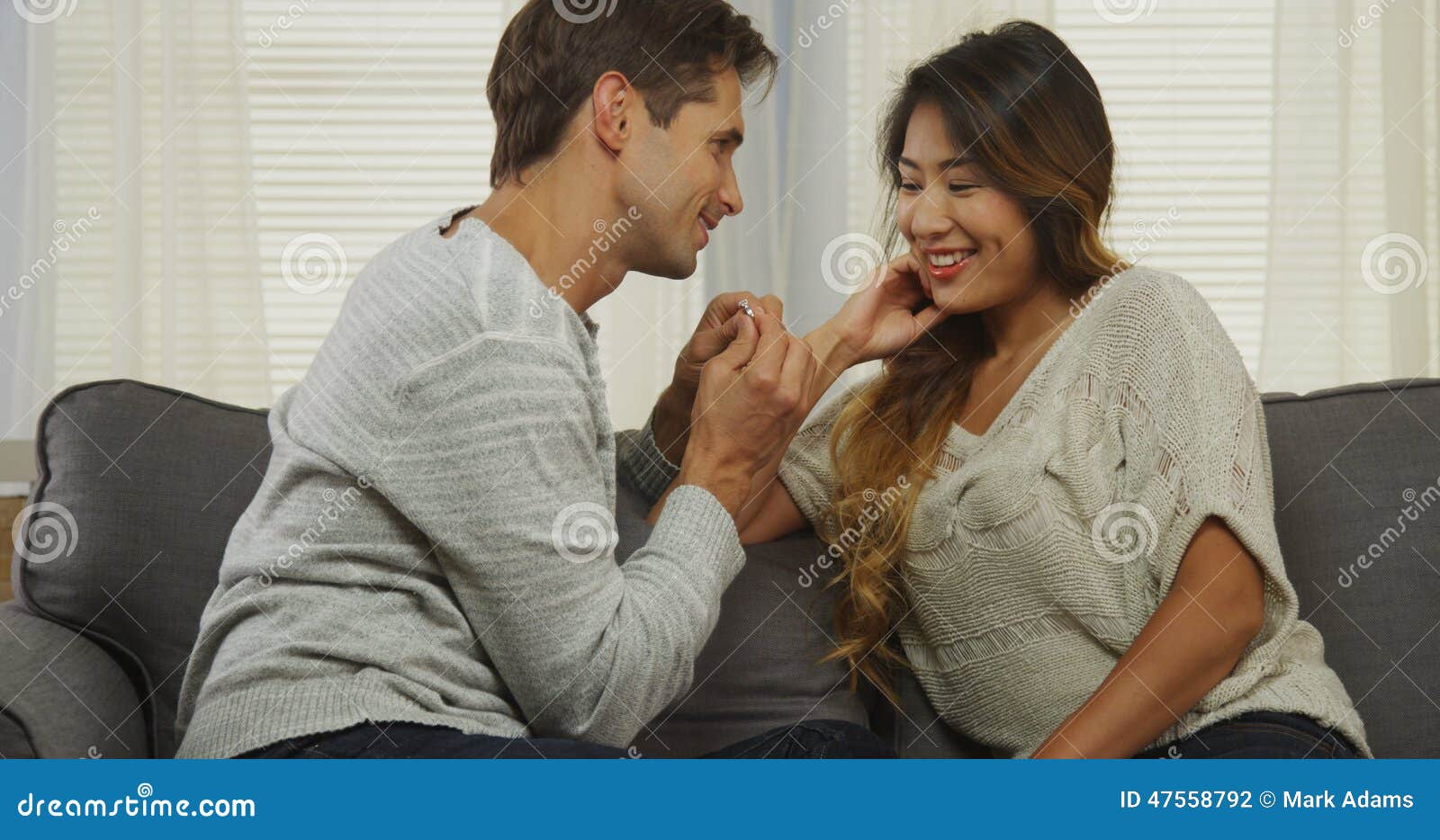 Interracial Couple Gets Engaged! Stock Photo - Image of listening ...