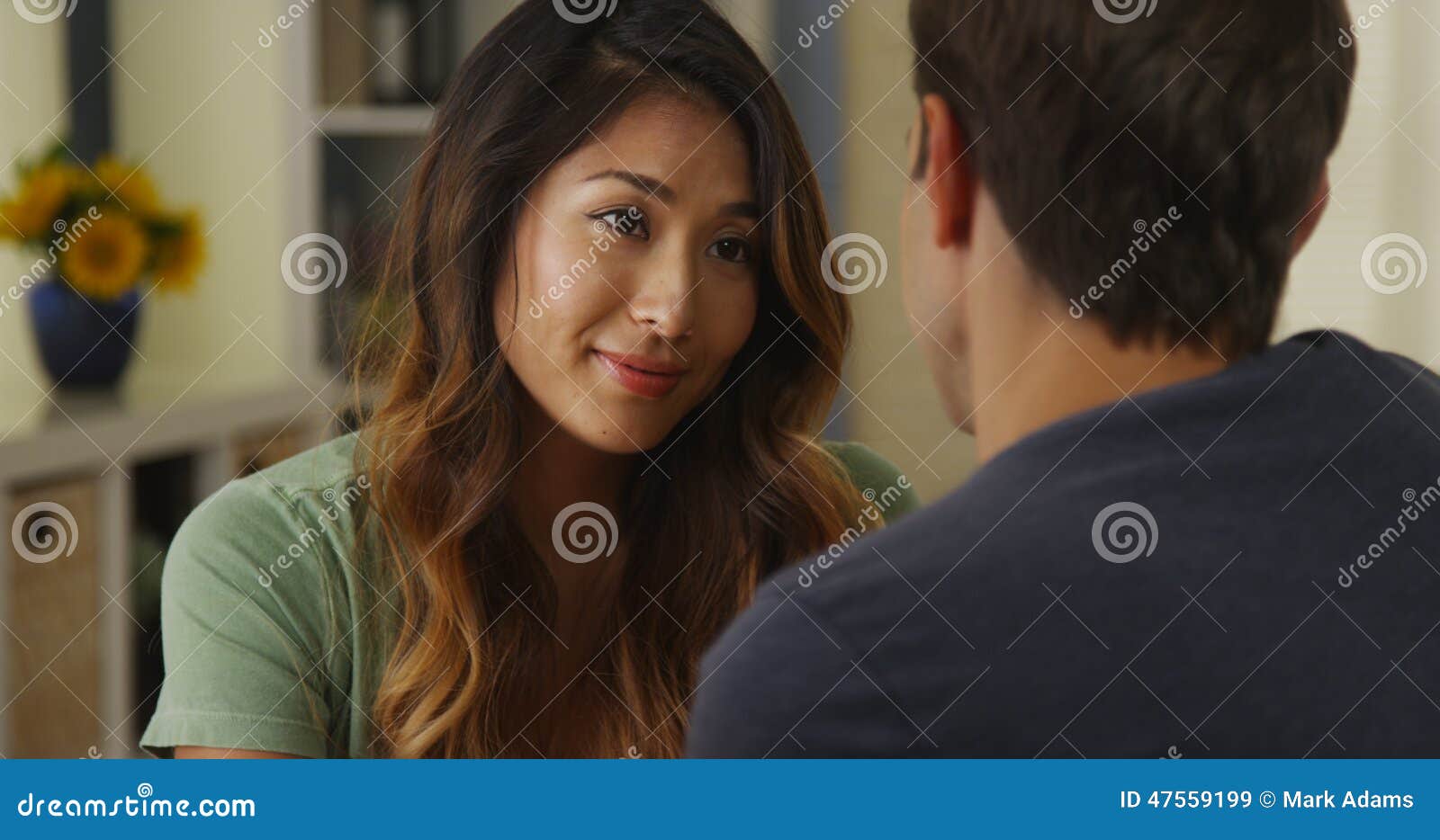 Interracial Couple Talking at Home Stock Image - Image of listening ...