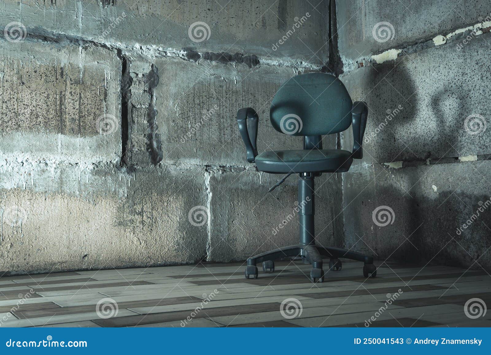 The Interrogation Chair. an Old Chair in a Concrete Basement Stock ...