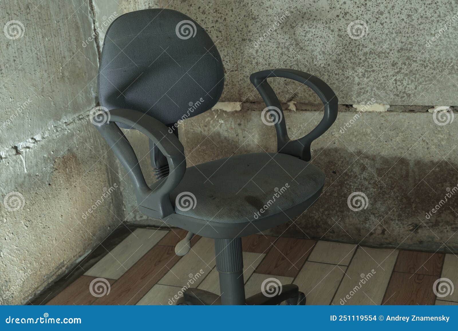 The Interrogation Chair. an Old Chair in a Concrete Basement Stock ...