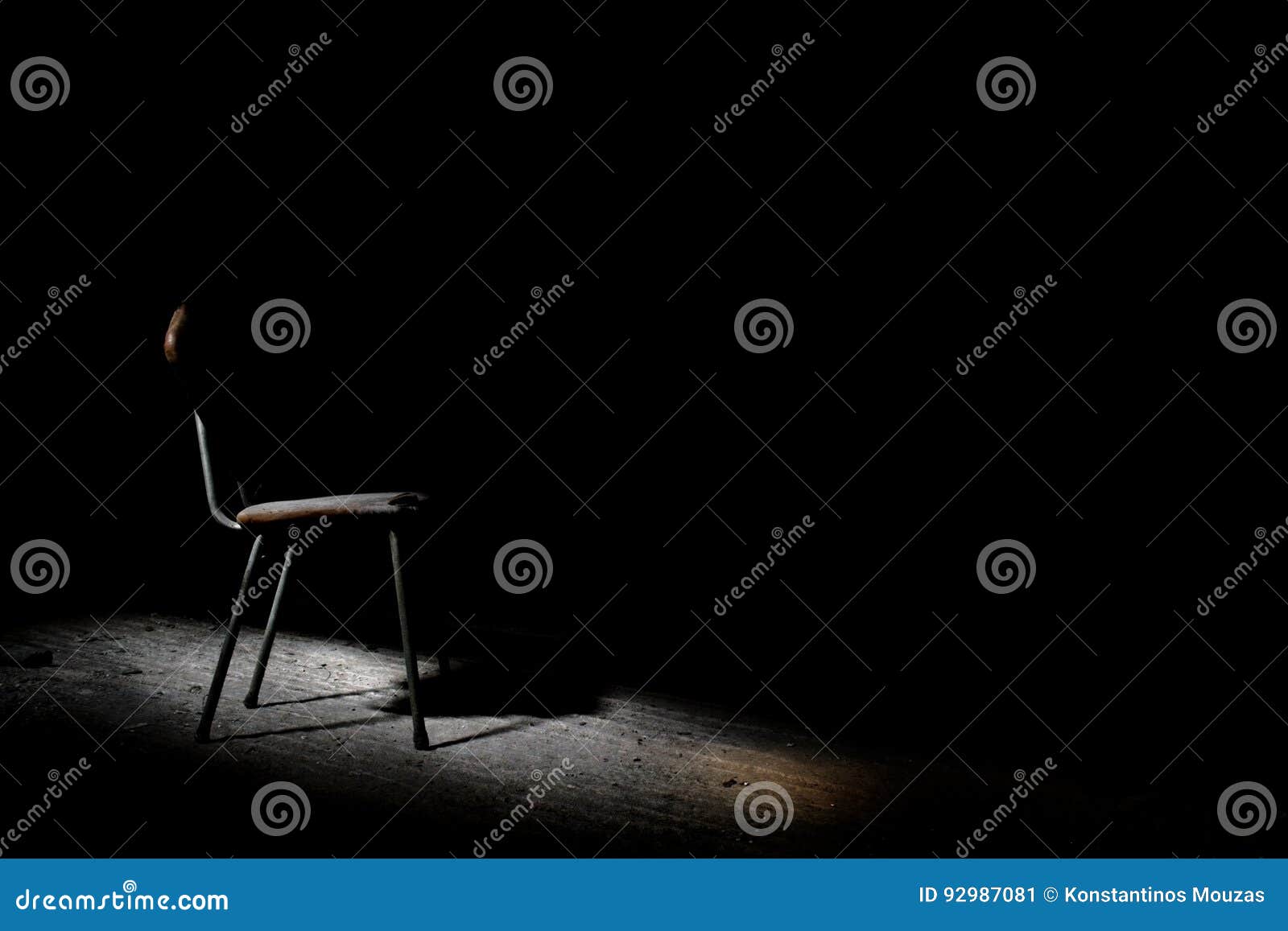 The Interrogation Chair. An Old Chair In A Concrete Basement. Royalty ...