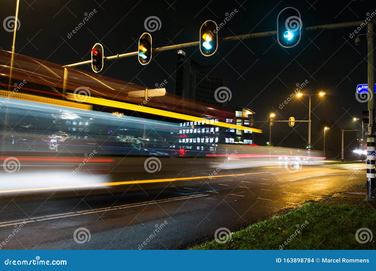 Intersection at Night with Traffic Blurred by Motion Stock Photo ...