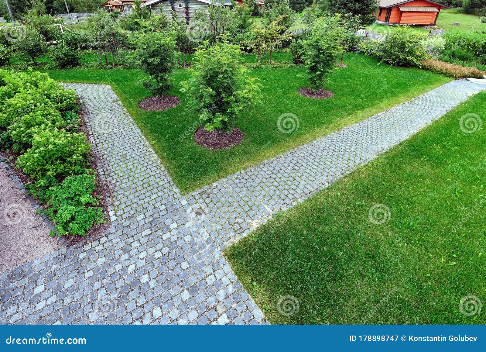 The Intersection of Paved Paths Surrounded by a Lawn with Free-standing ...