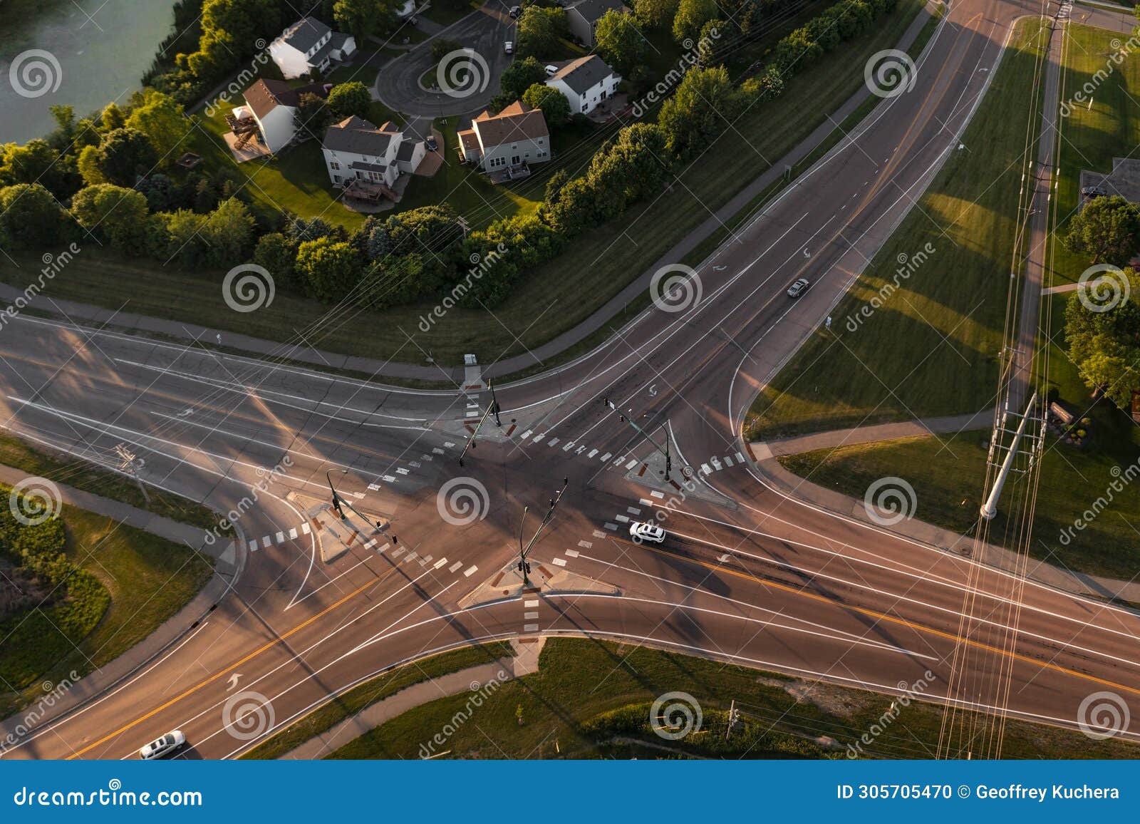 Intersection Trees and Homes Stock Photo - Image of residential ...