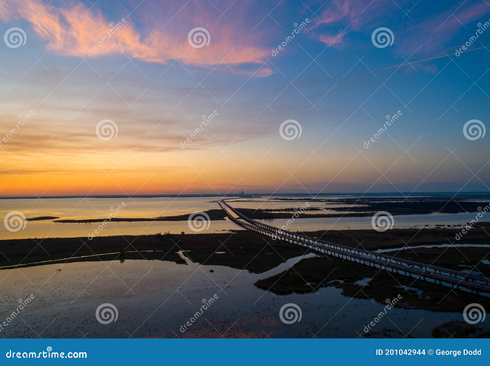 Interstate 10 Bridge on Mobile Bay at Sunset in November Stock Photo ...