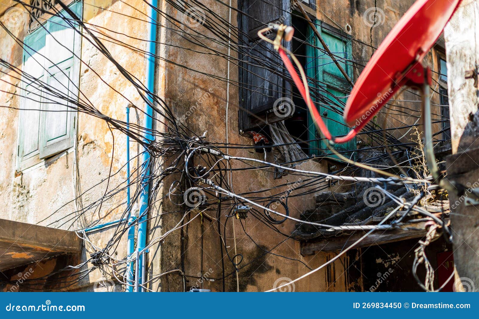 Intertwined Electric Wires in Front of Buildings Which is the First ...