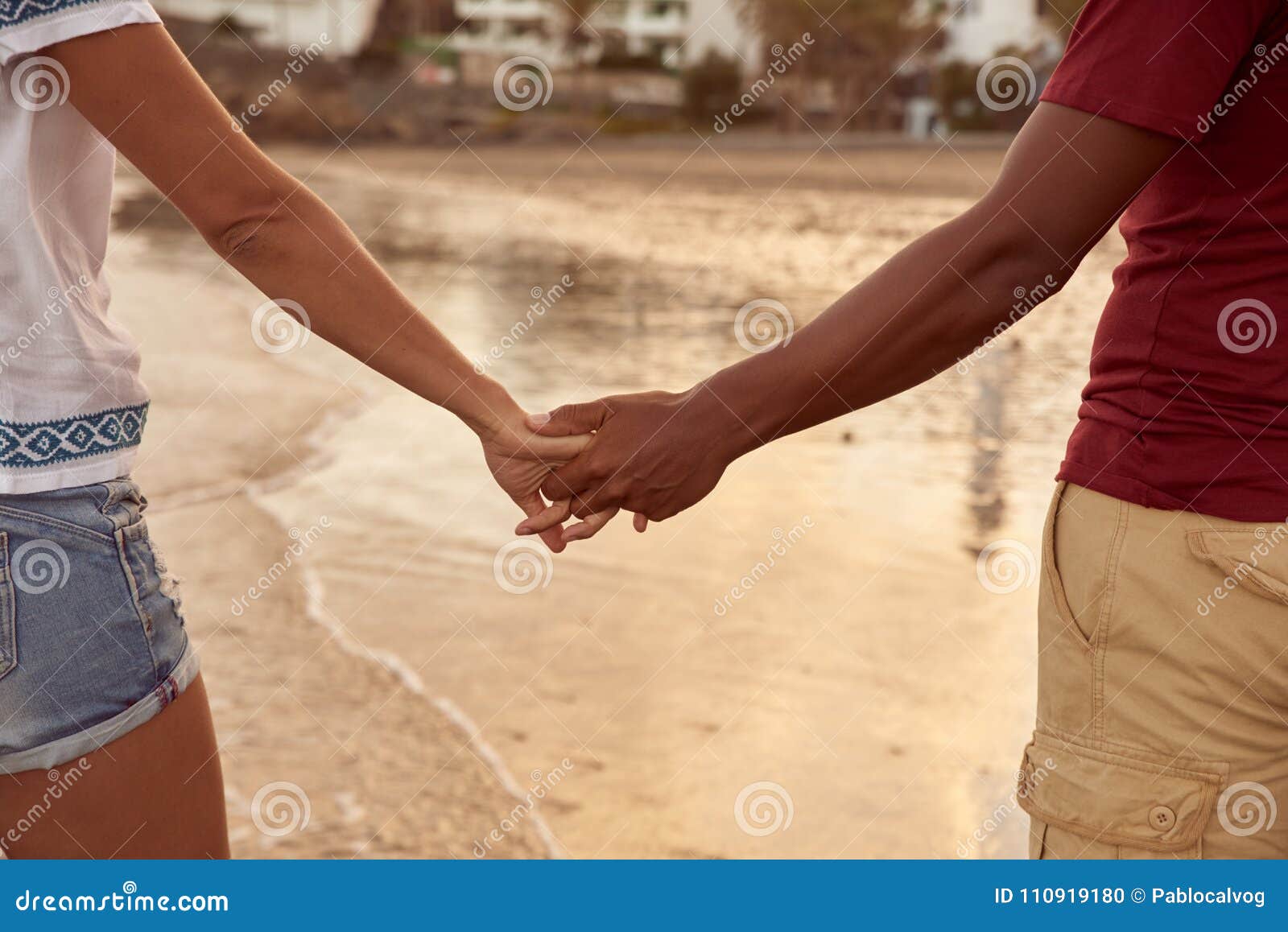 Intertwined Fingers with Reflections in Water Stock Photo - Image of ...